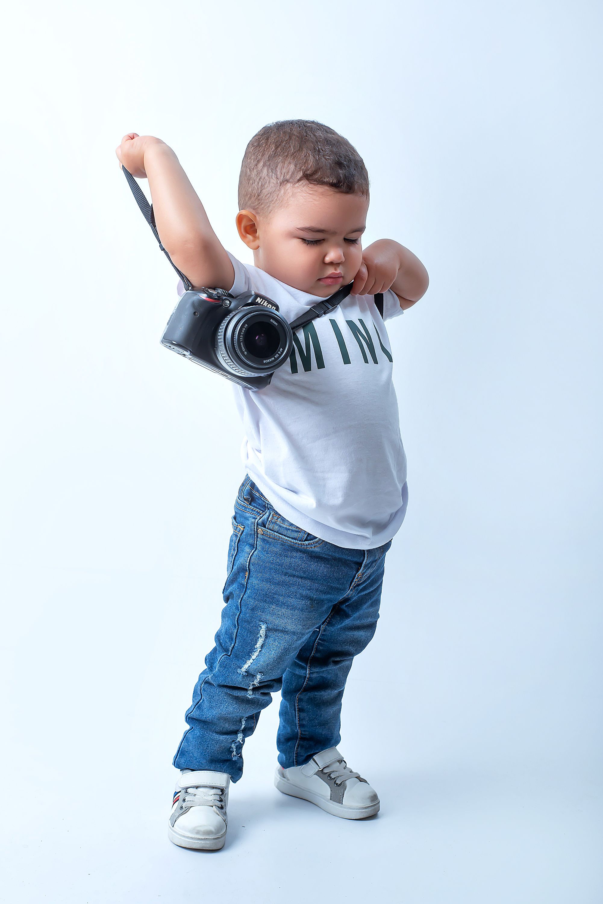 Child Standing with Digital Camera · Free Stock Photo