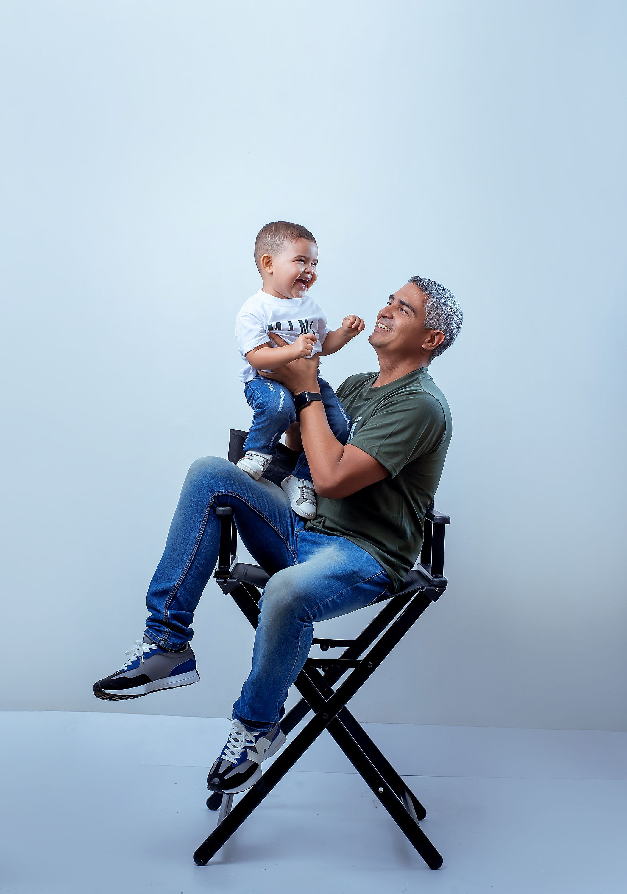 Man Holding His Child · Free Stock Photo