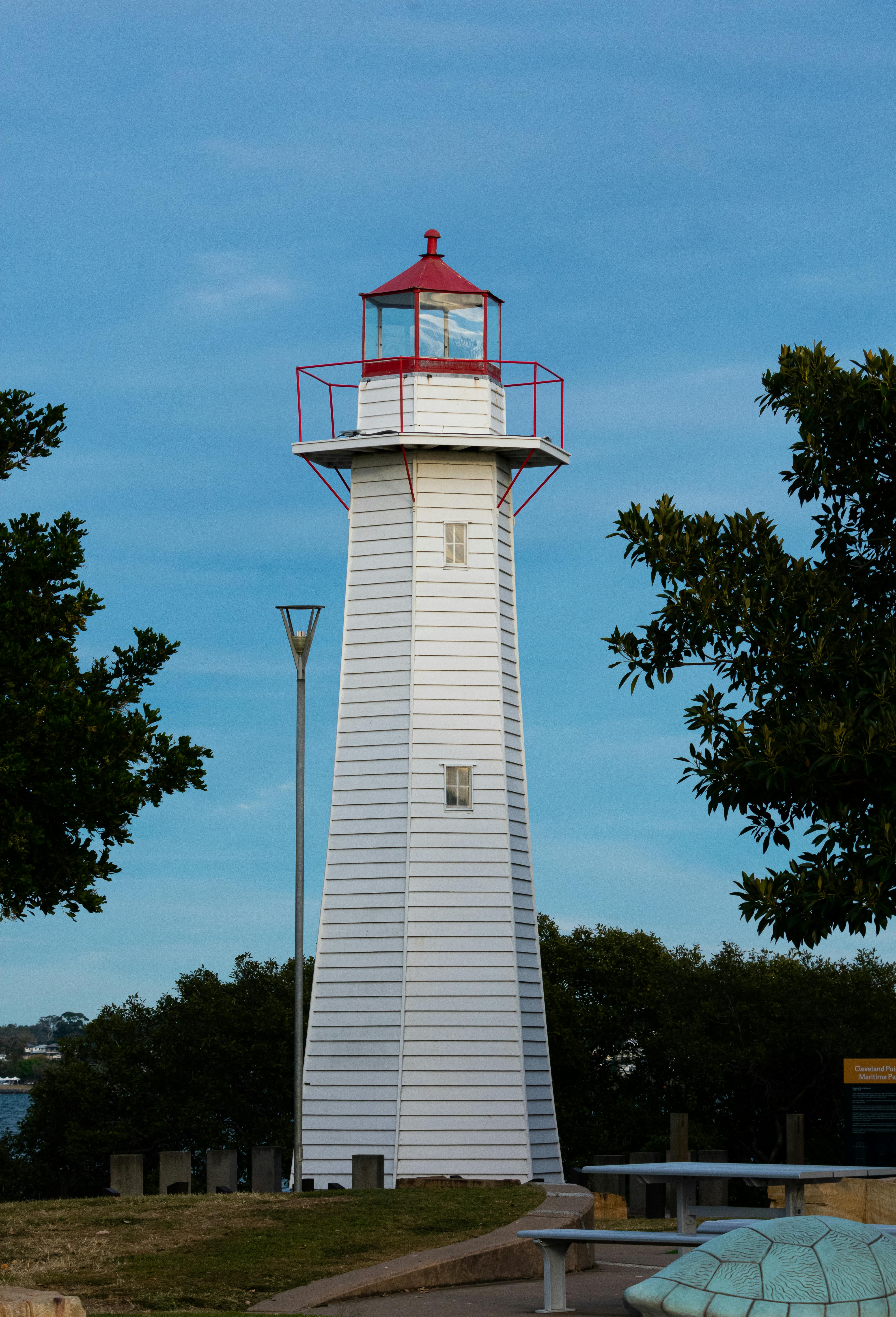 White and Red Lighthouse · Free Stock Photo