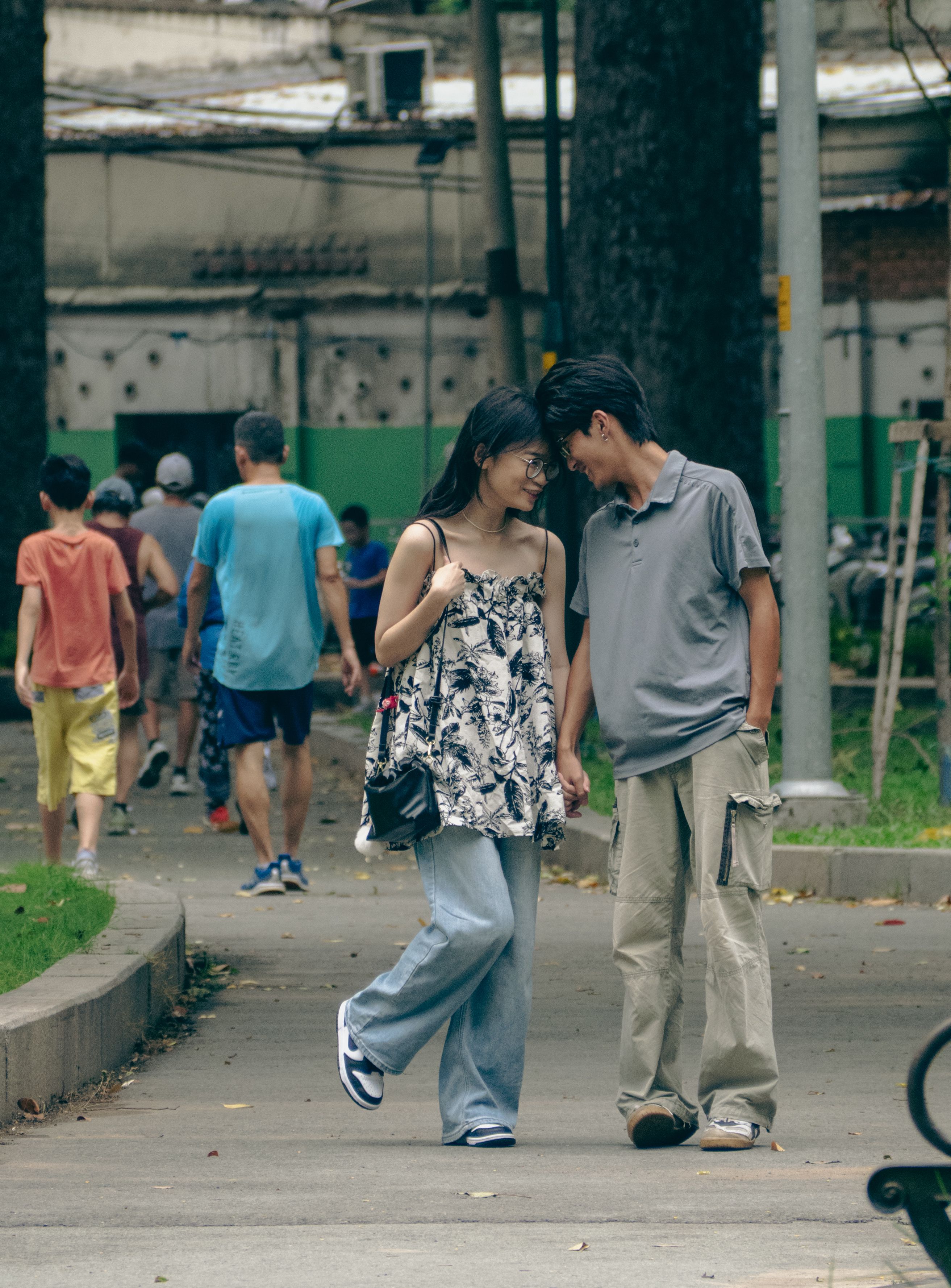Lovely Couple Holding Hands and Touching Each Others Head · Free Stock Photo