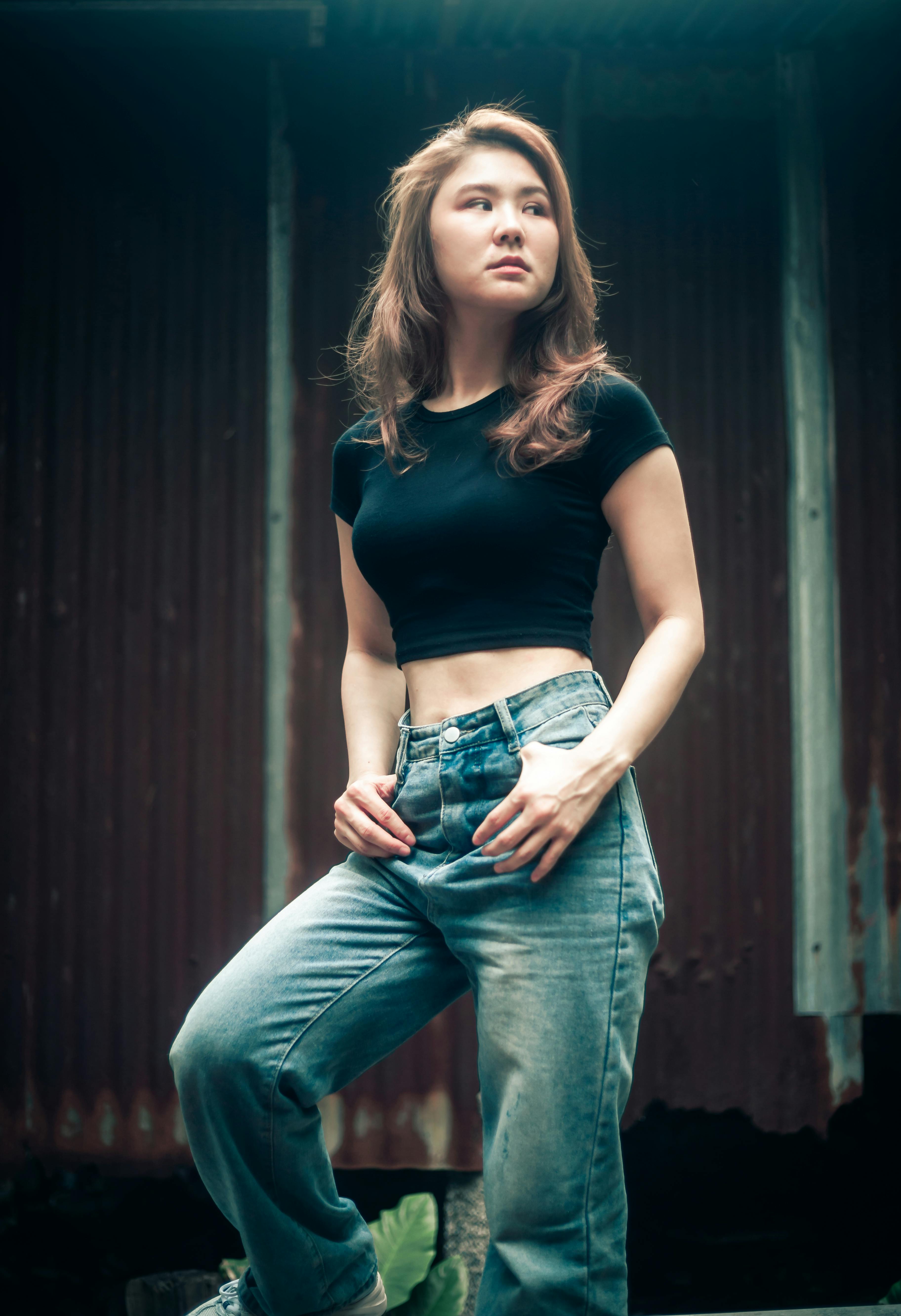 Young Model in Black Crop Top and Jeans · Free Stock Photo