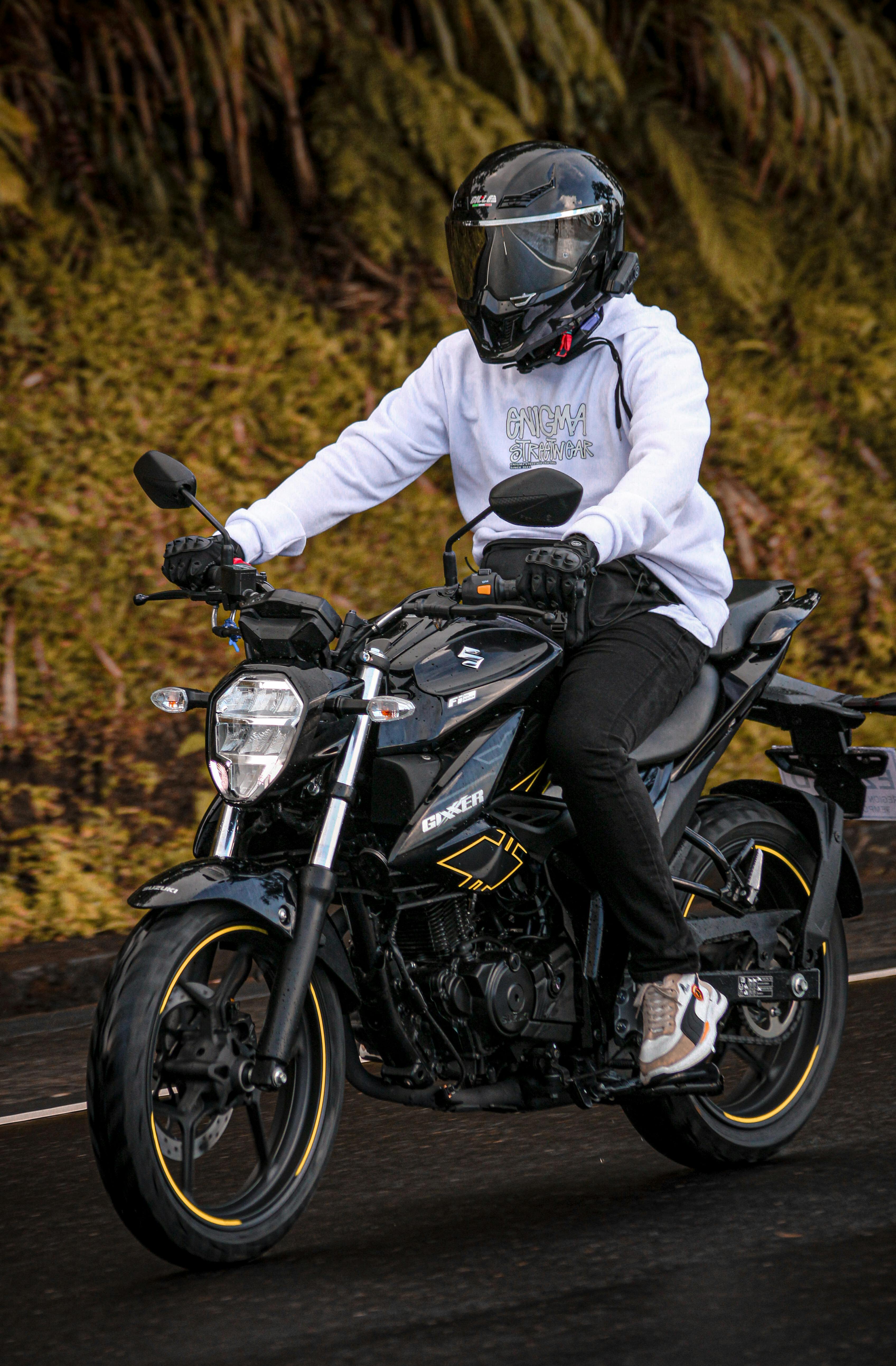 A Person Riding a Motorcycle · Free Stock Photo