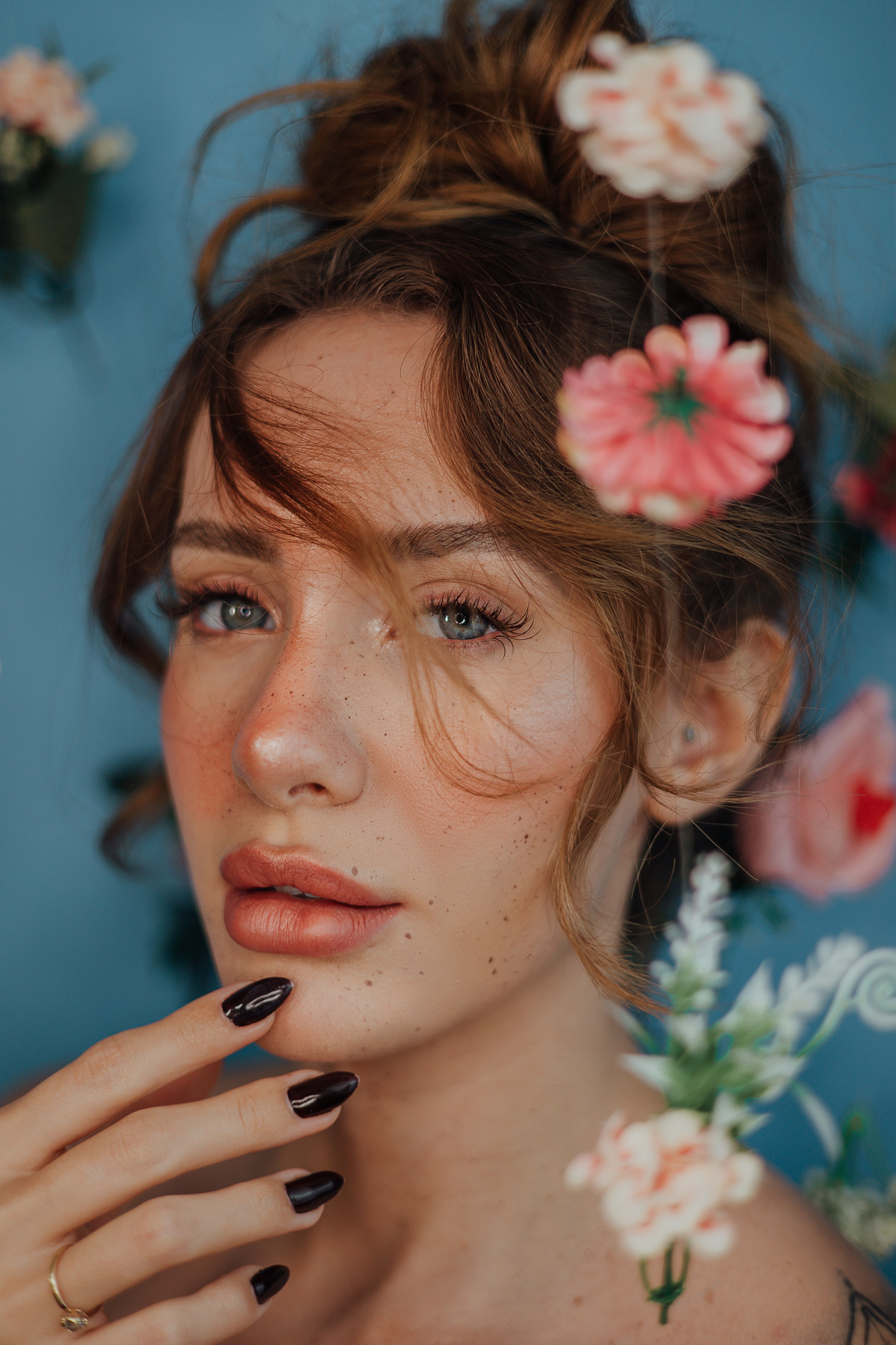 Portrait of Woman with Flowers around · Free Stock Photo