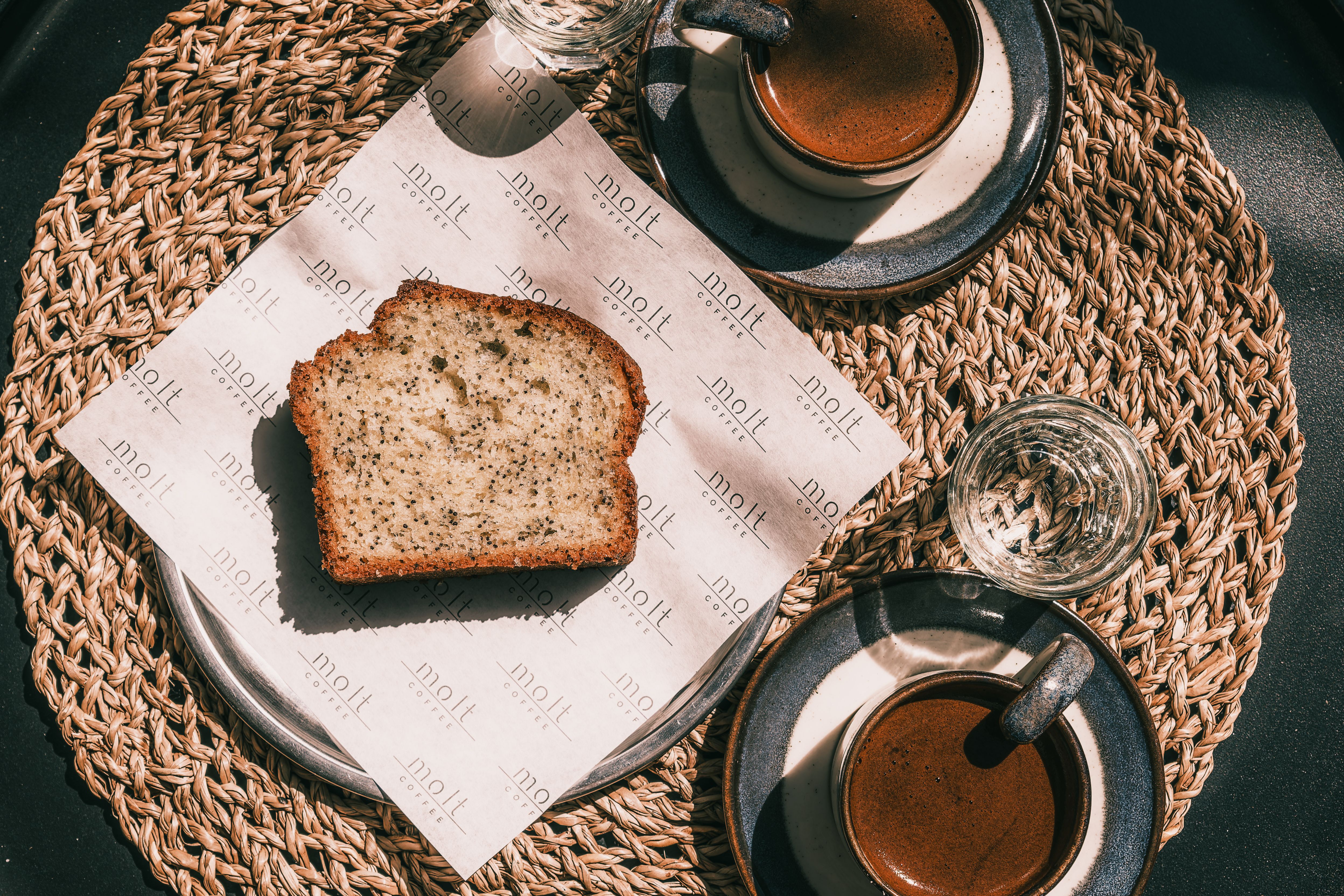 Two Cups of Black Coffee and a Slice of Cake Lying on a Table · Free ...