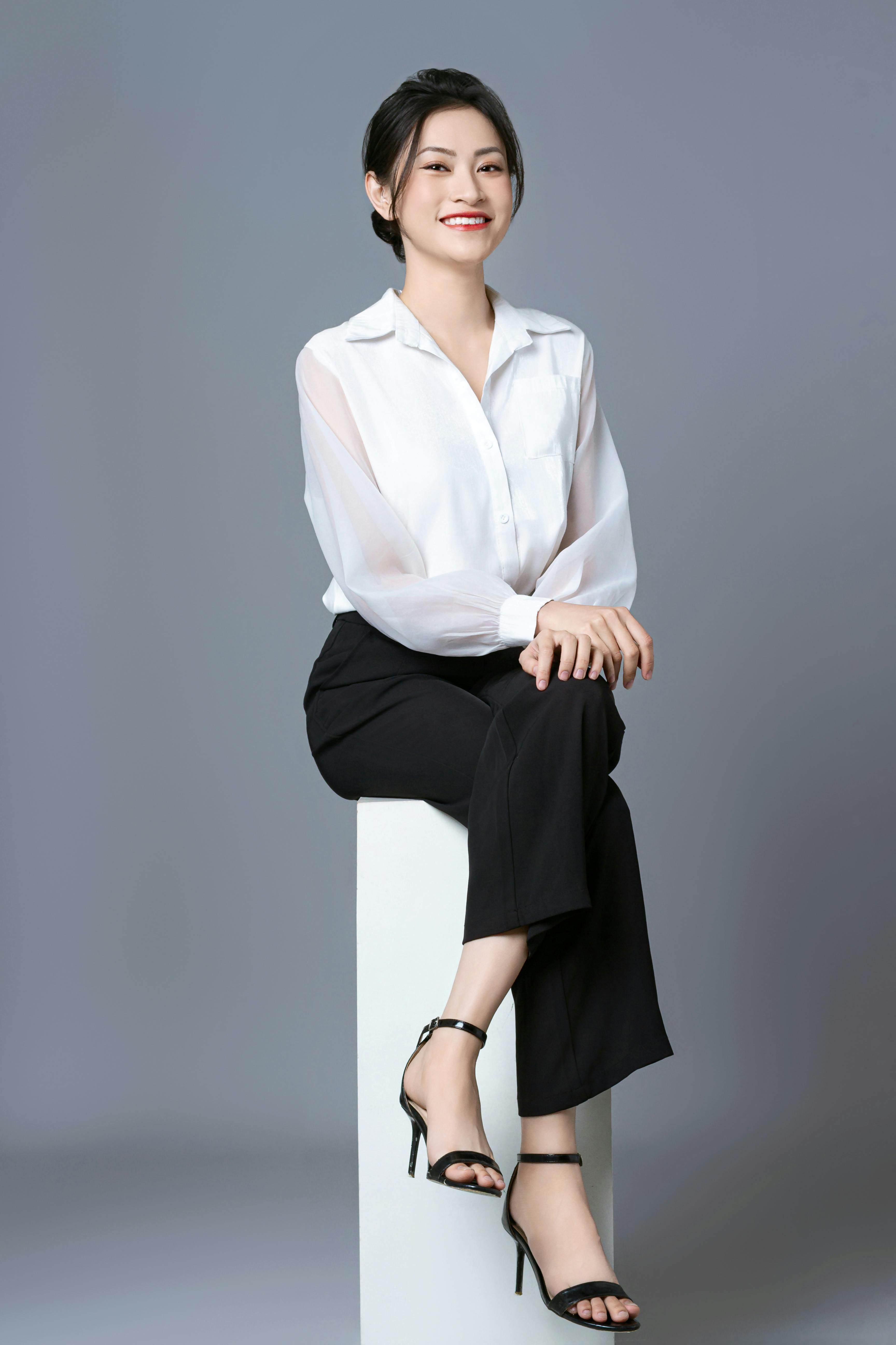 Woman Posing in Formal Clothes in Studio · Free Stock Photo