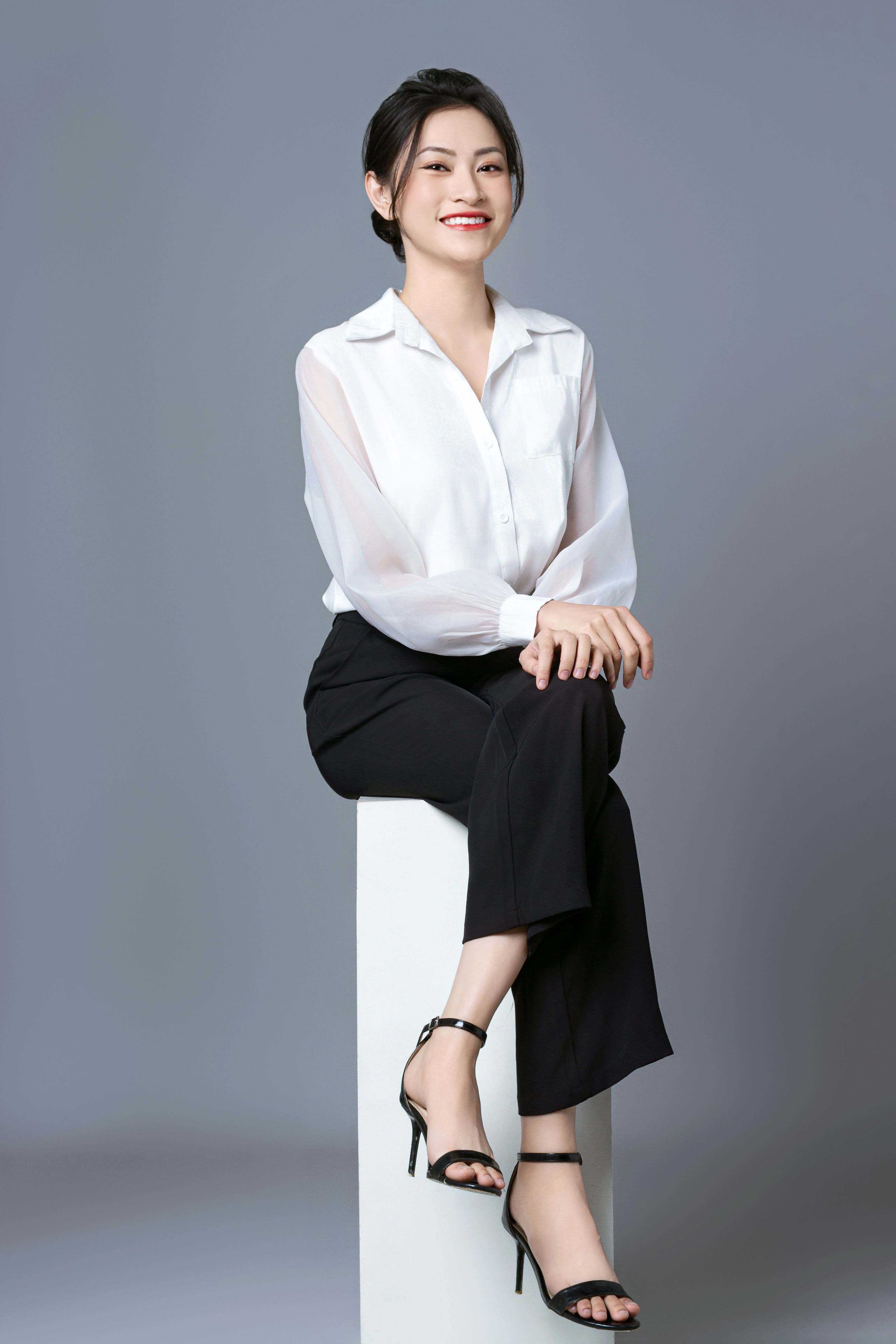Woman Posing in Formal Clothes in Studio · Free Stock Photo