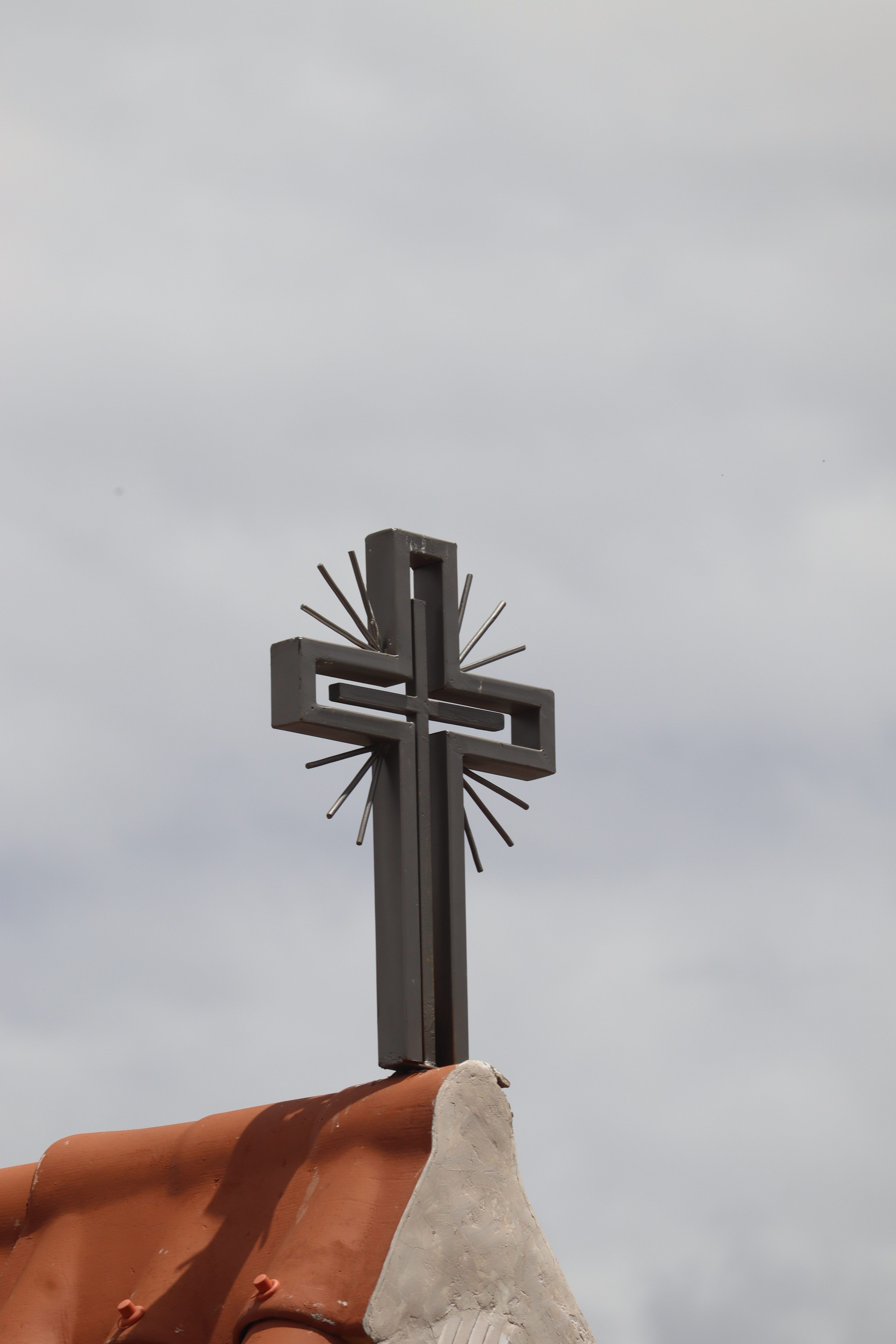 Steel Cross on Church Rooftop · Free Stock Photo