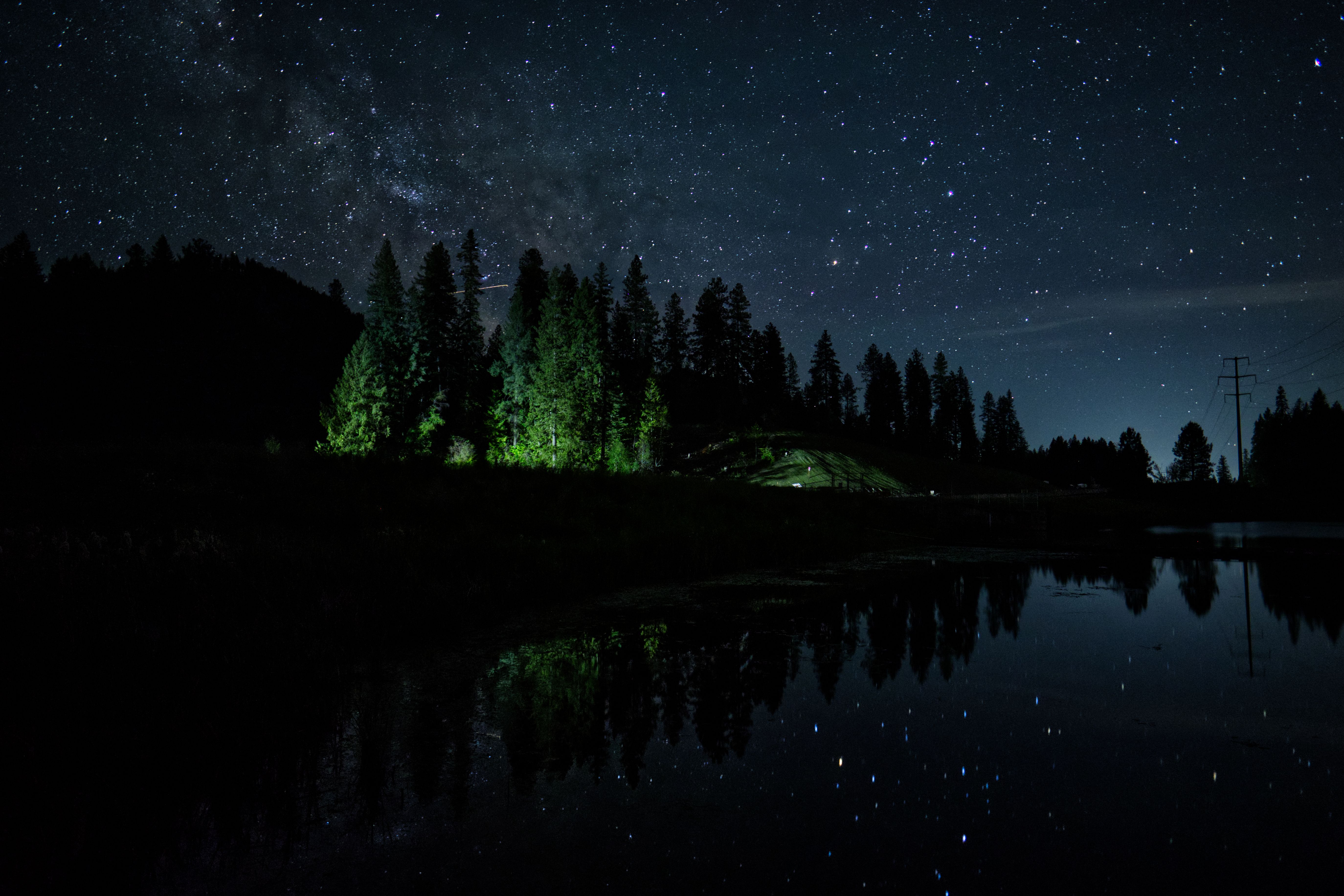 Starry Night Sky Reflecting in a Lake · Free Stock Photo