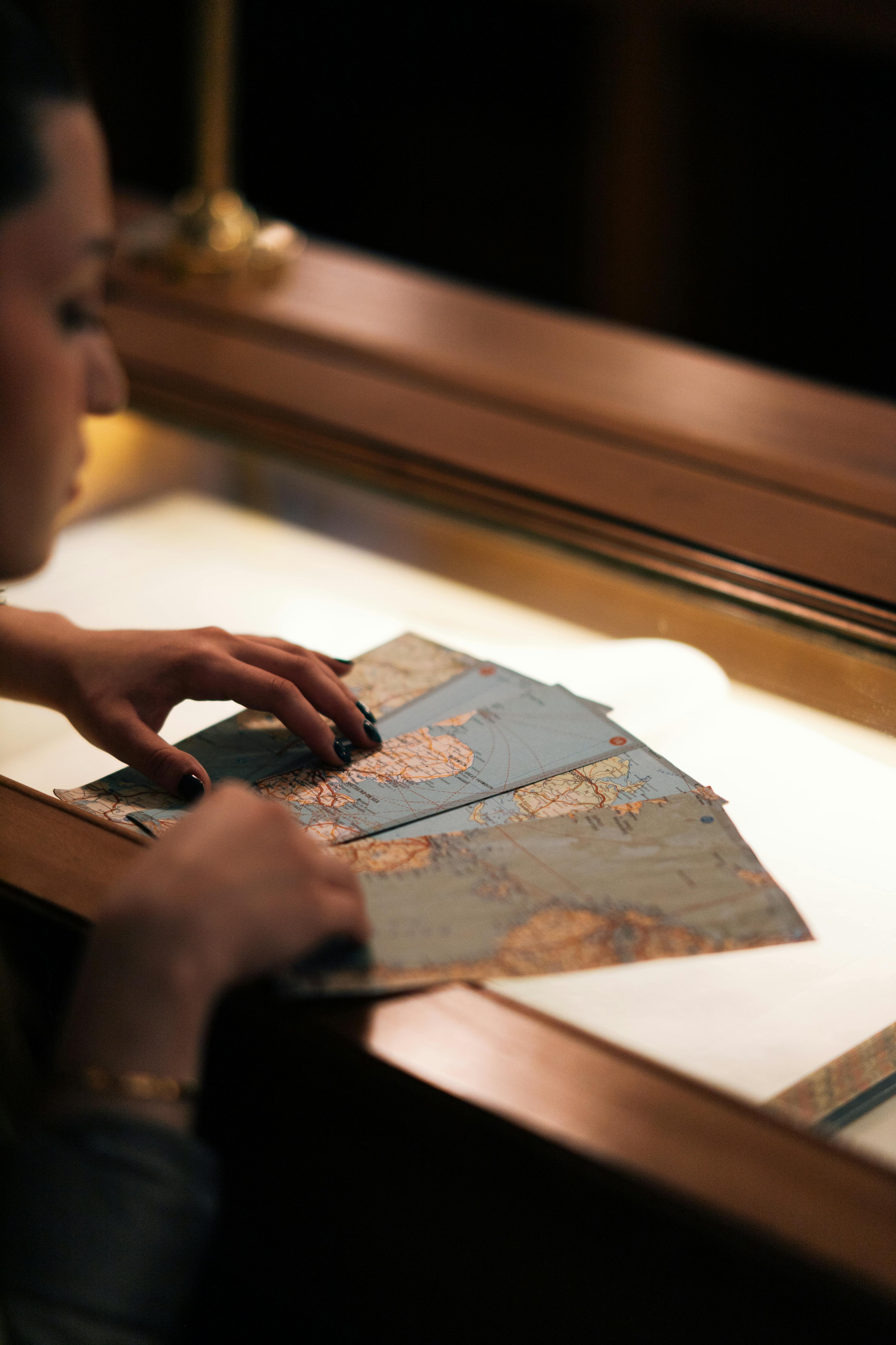 Person Holding Maps · Free Stock Photo