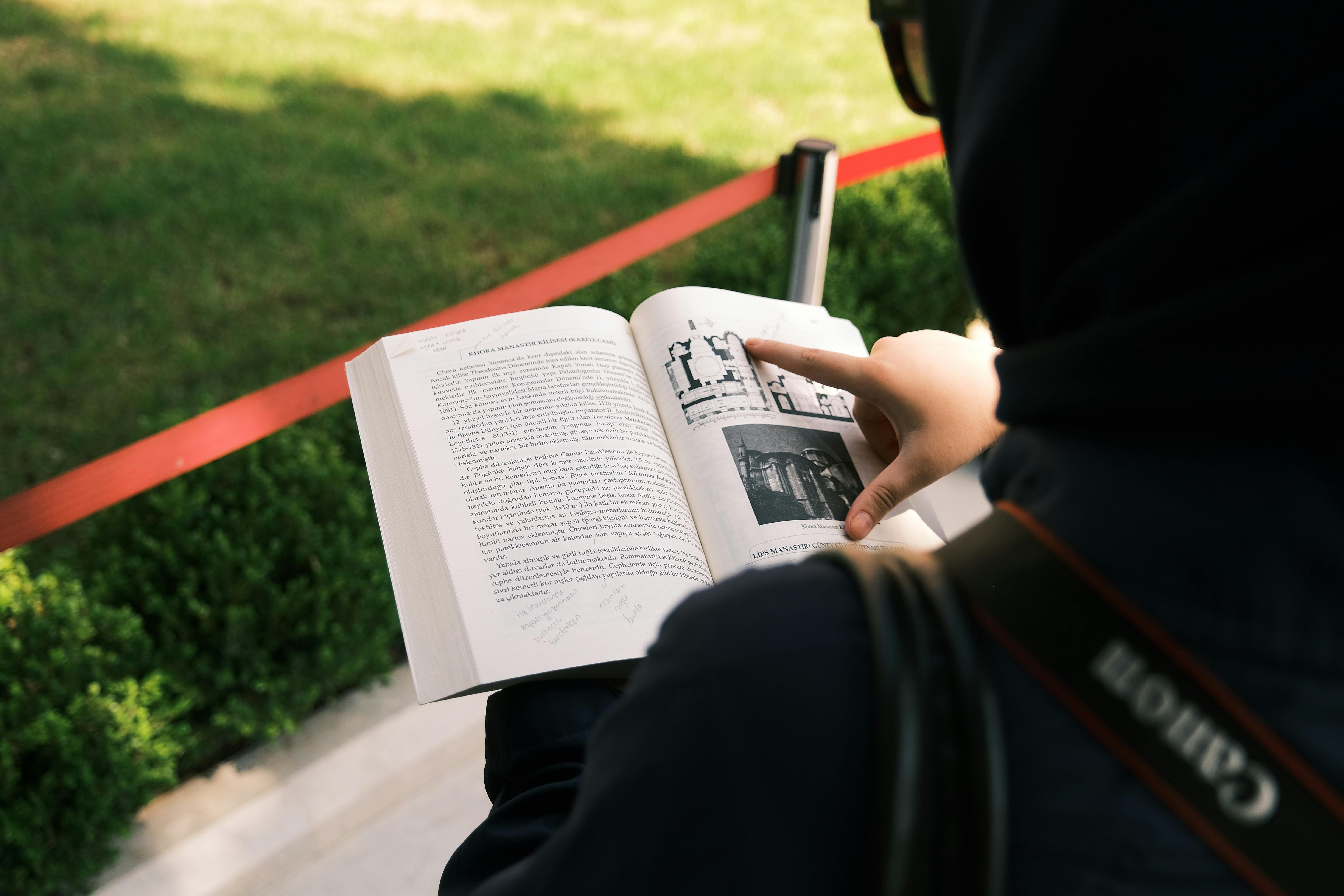 A Person Reading a Book · Free Stock Photo