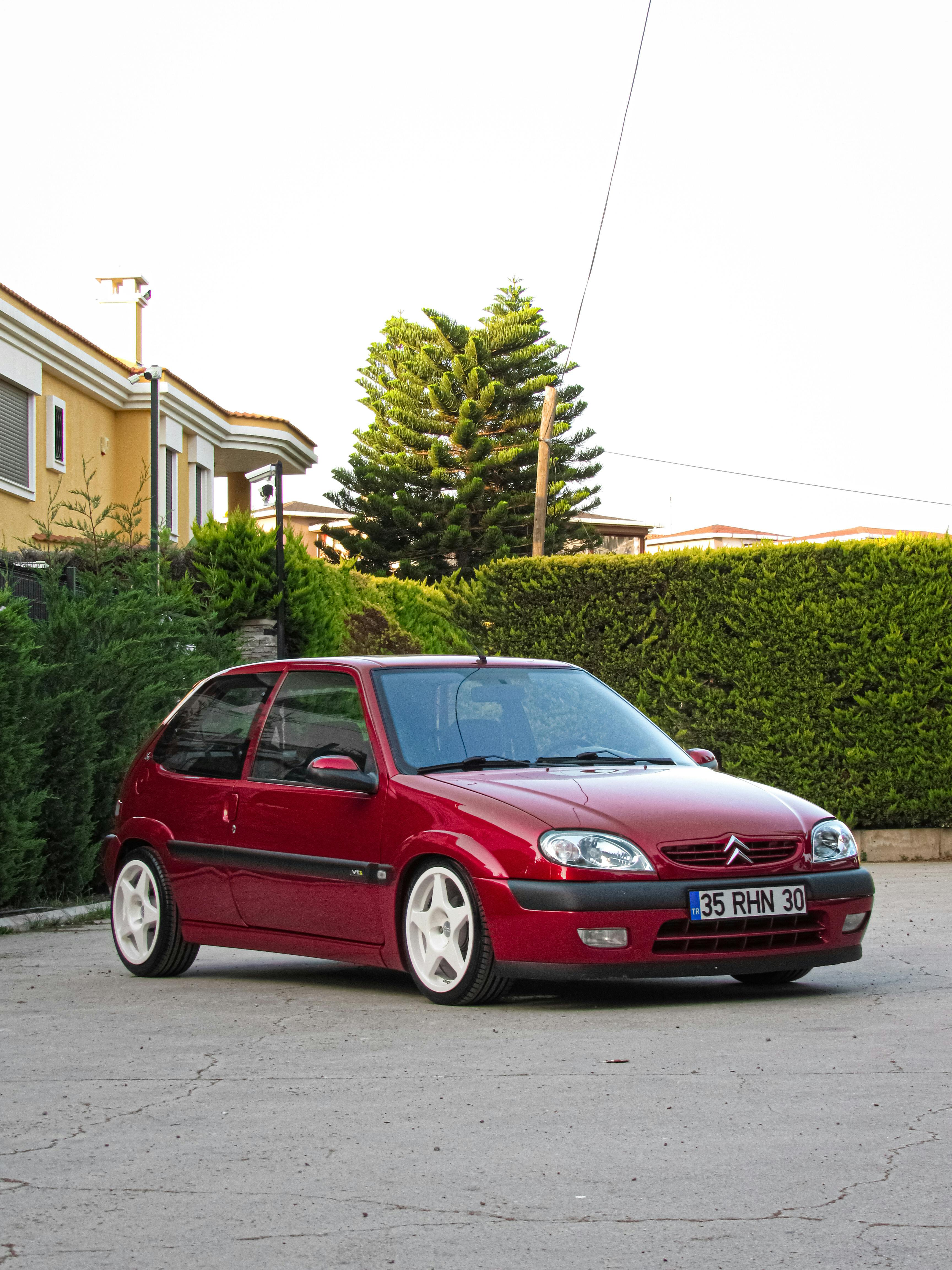 Red Car on a Road · Free Stock Photo