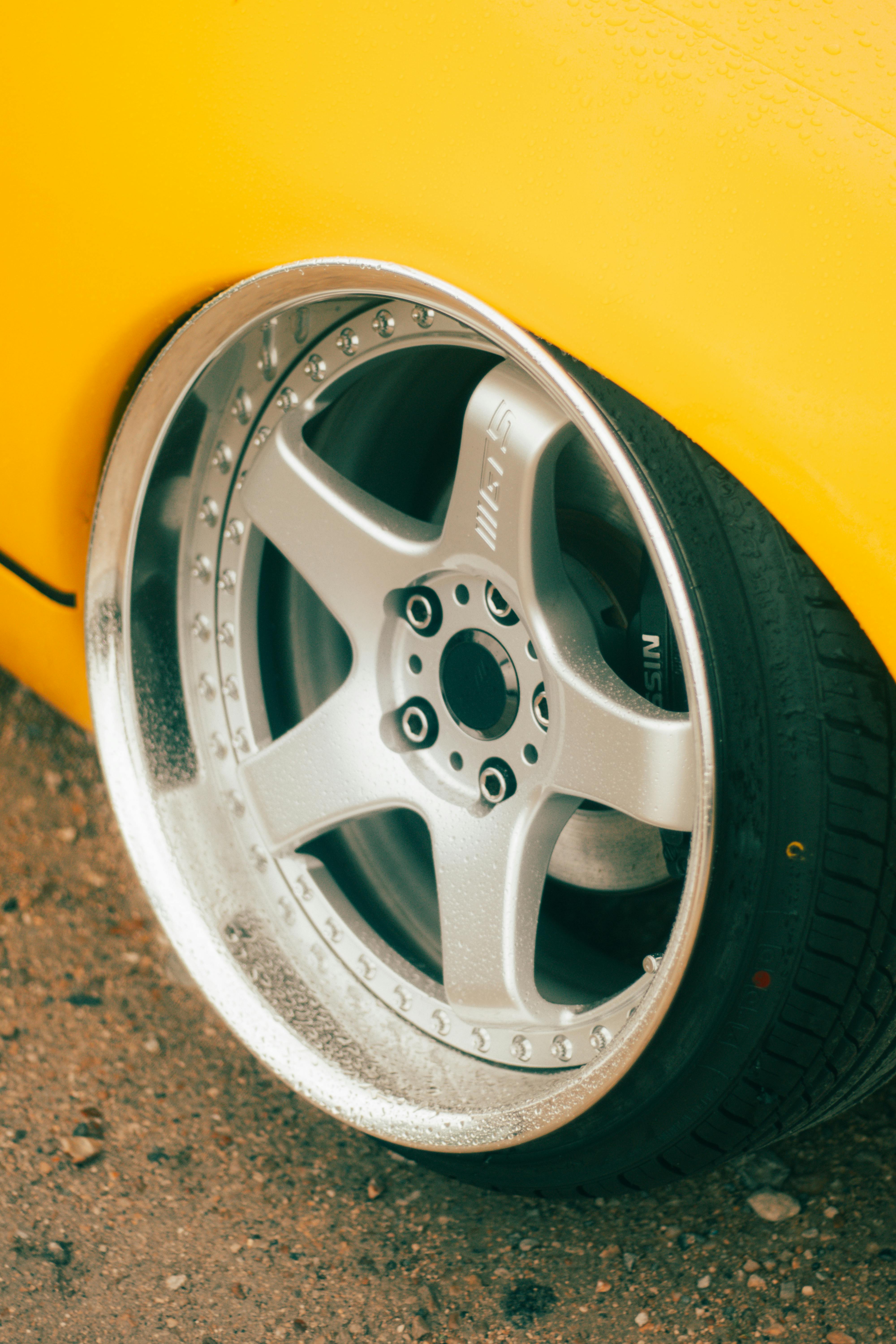 Wheel of Yellow Car · Free Stock Photo