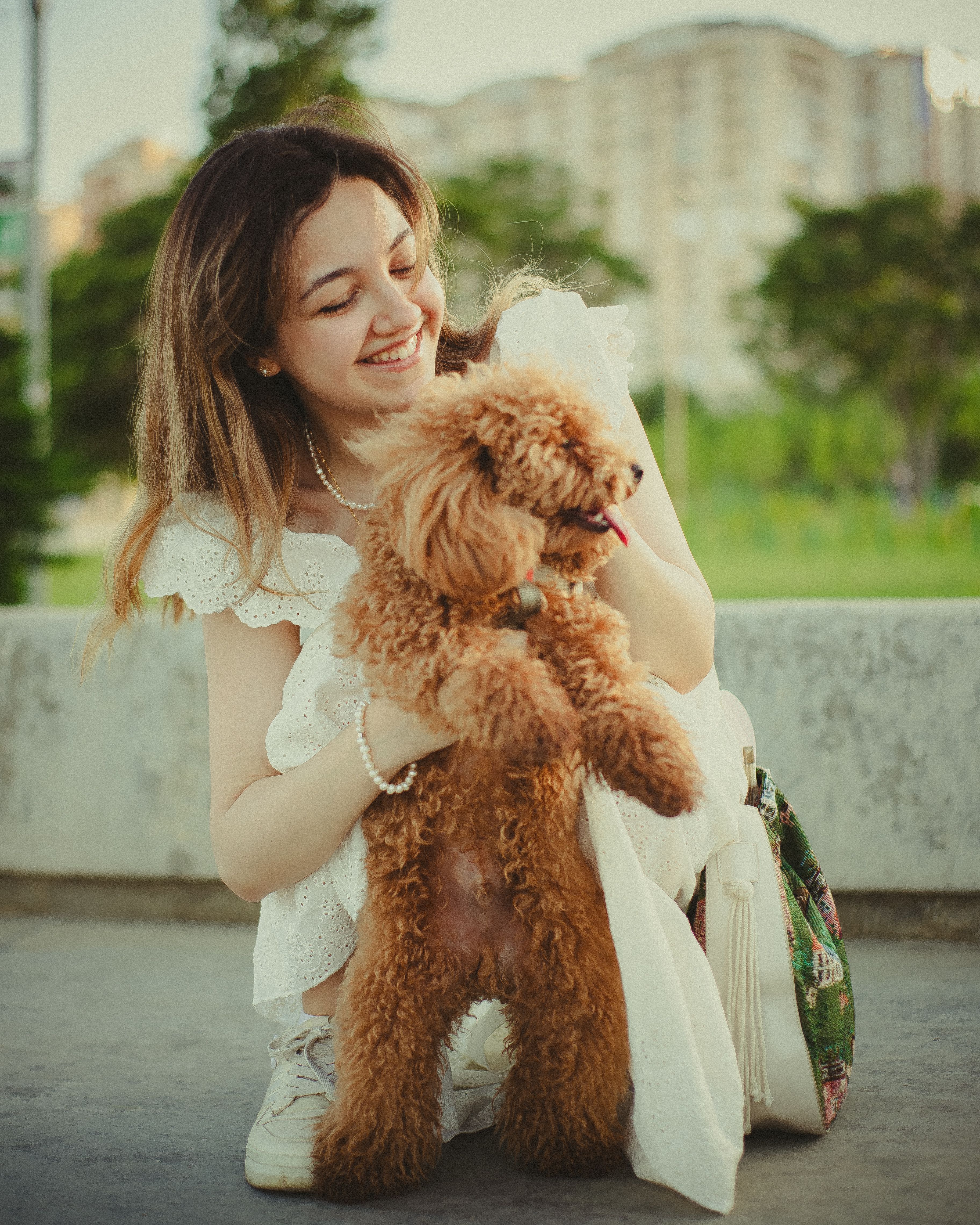 Smiling Woman with Poodle Dog · Free Stock Photo