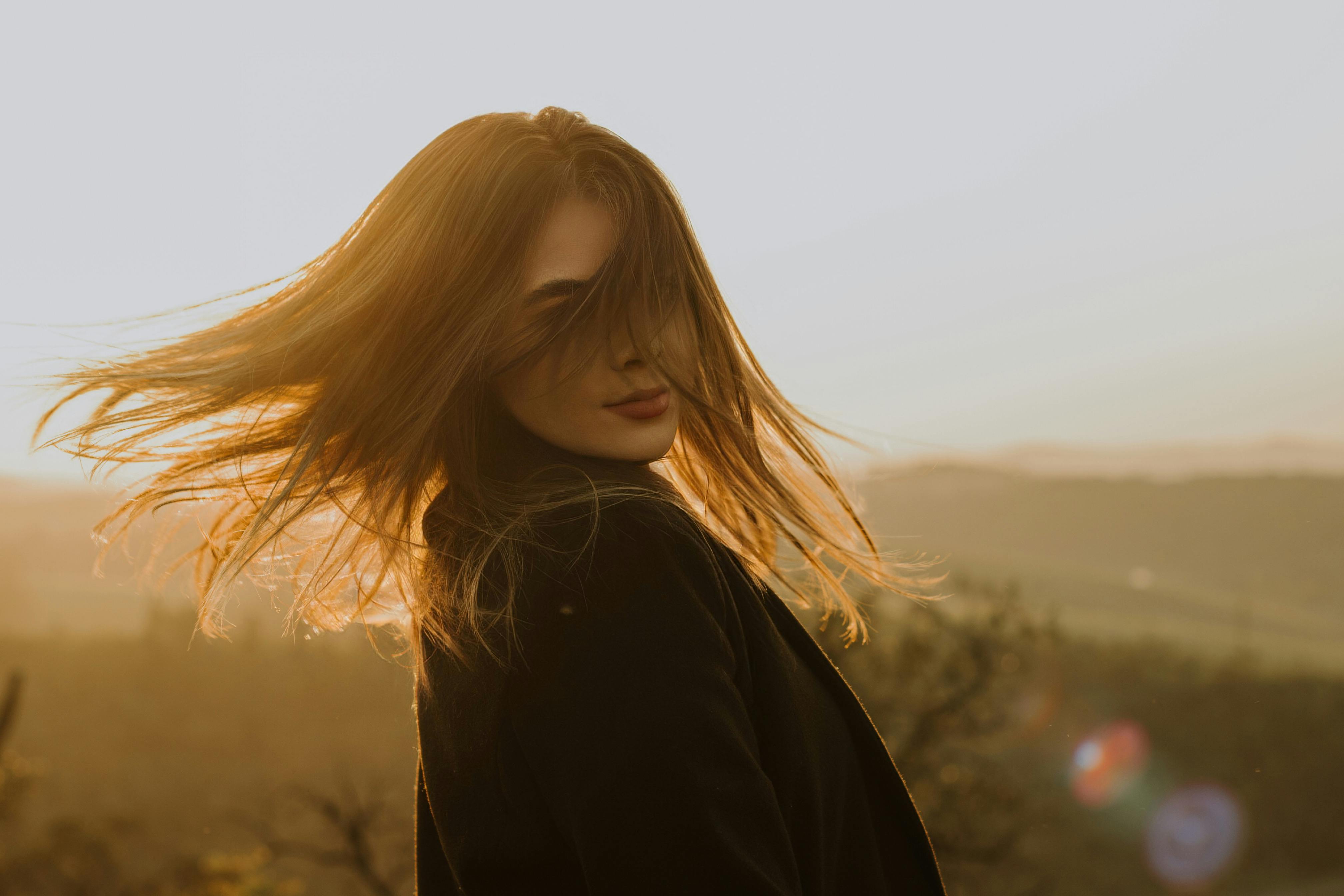 Woman Turning Head and Moving Hair · Free Stock Photo
