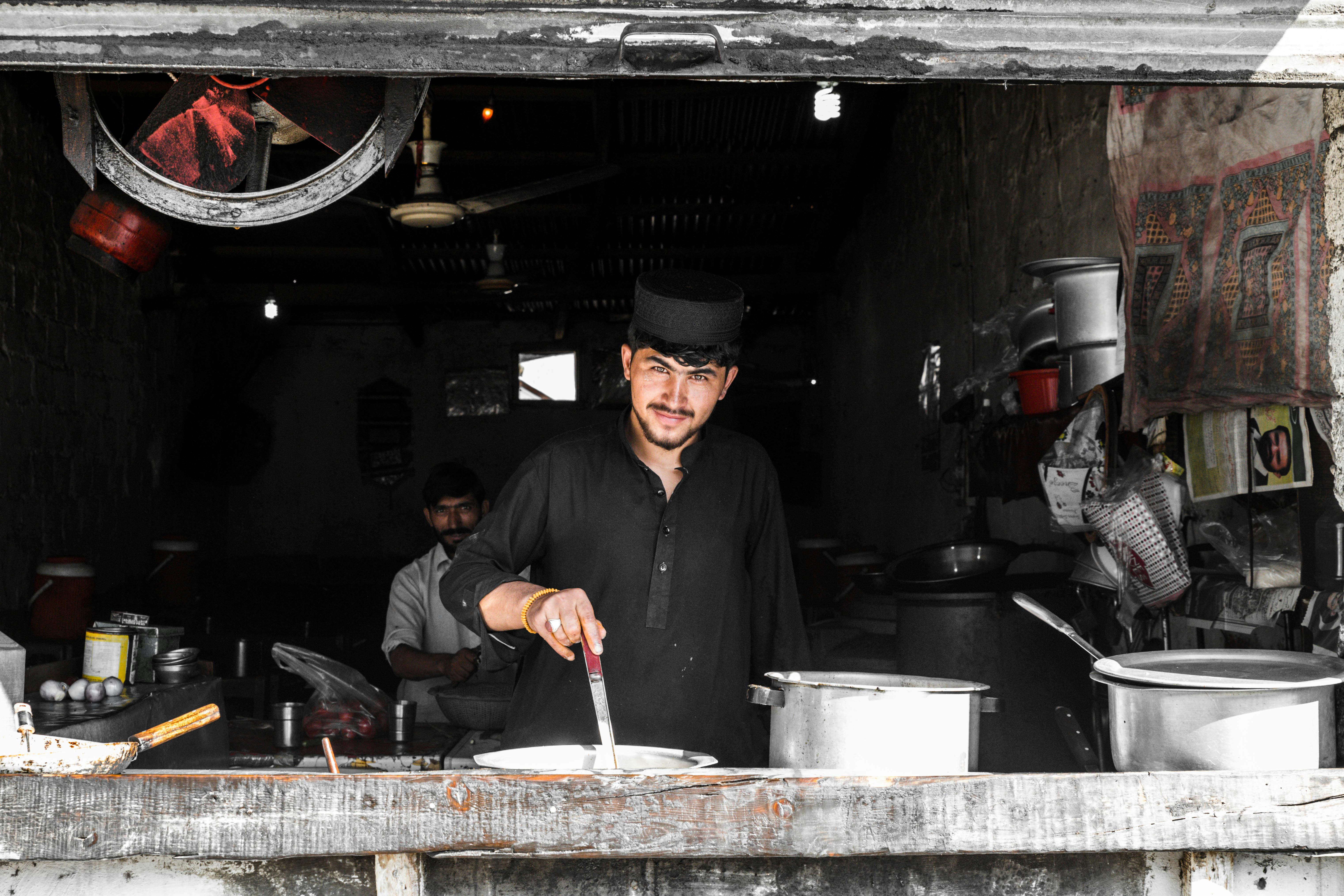 Man Cooks at the Diner · Free Stock Photo