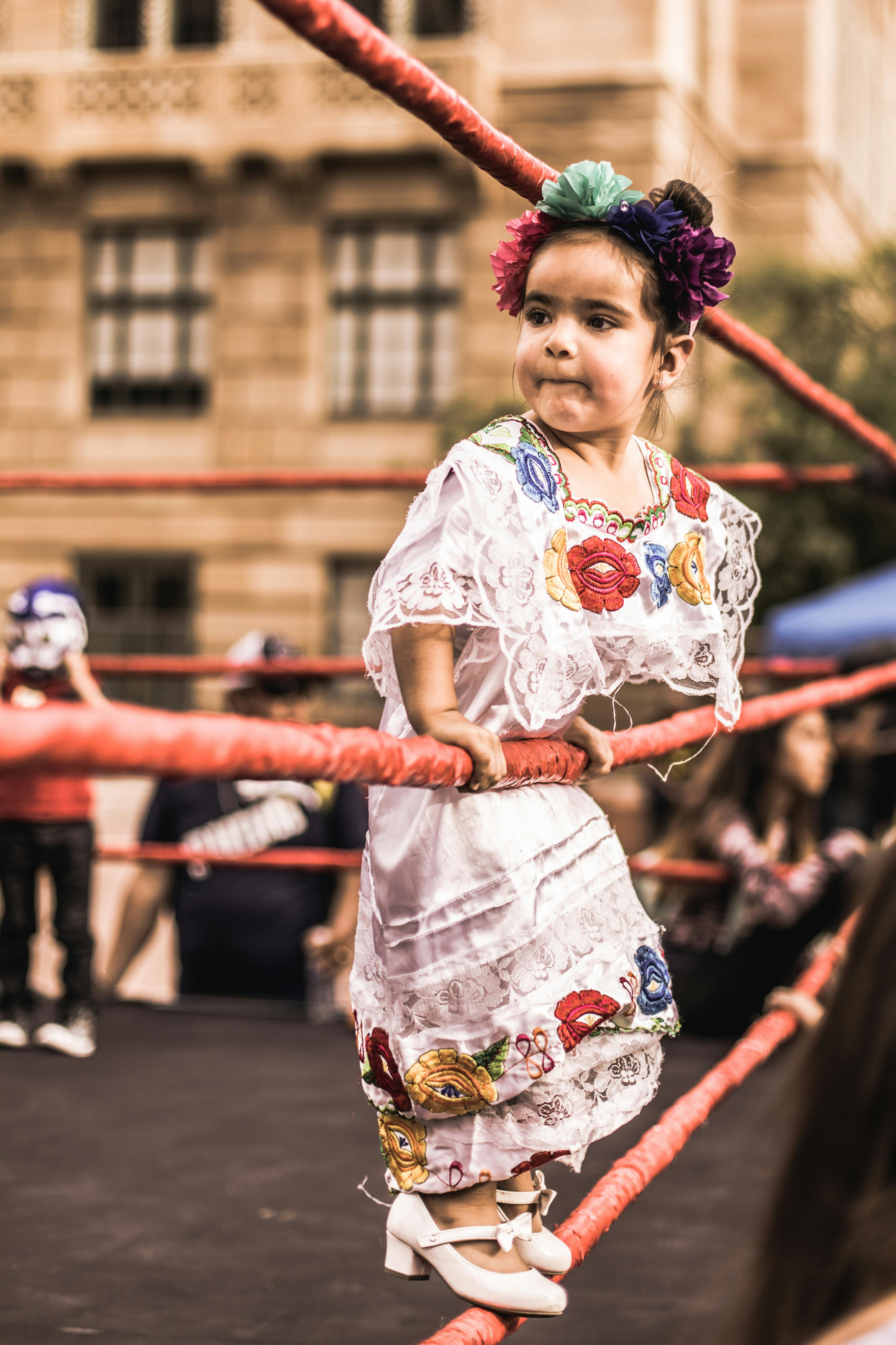 Selective Focus of Girl Standing on Rope · Free Stock Photo