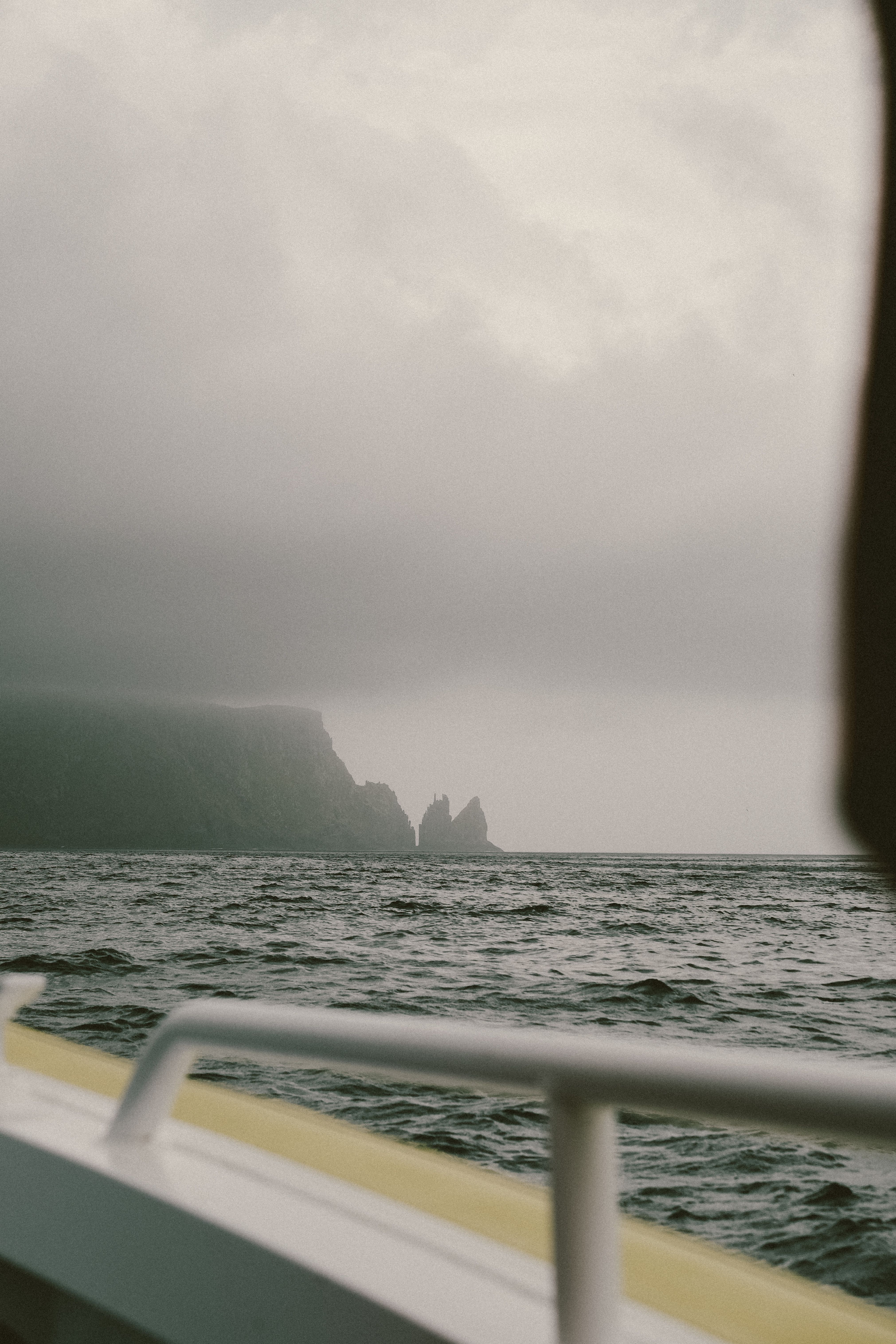 Rain Over the Cliff from the Boat · Free Stock Photo