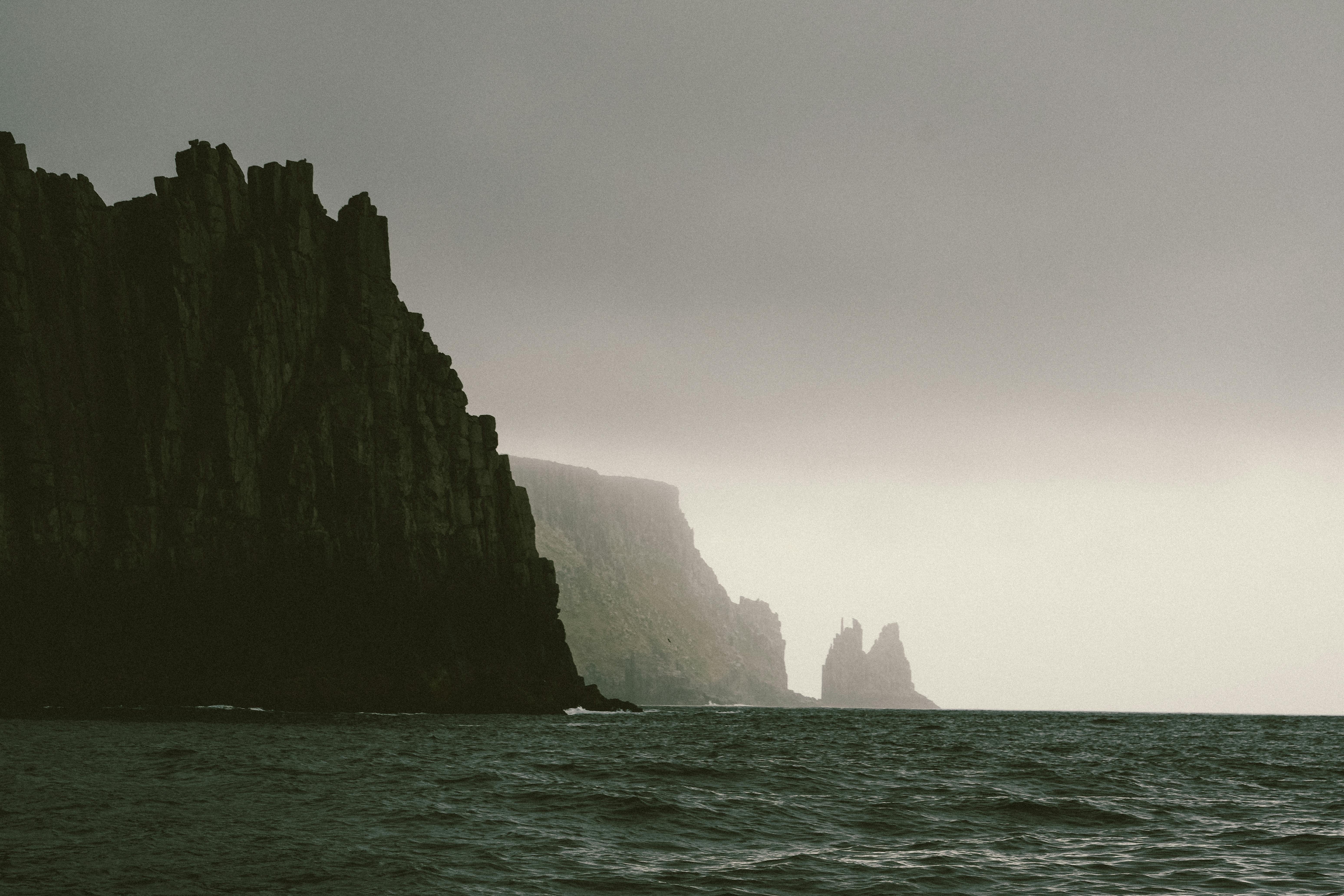 Rocky Seaside Cliffs in the Rain · Free Stock Photo