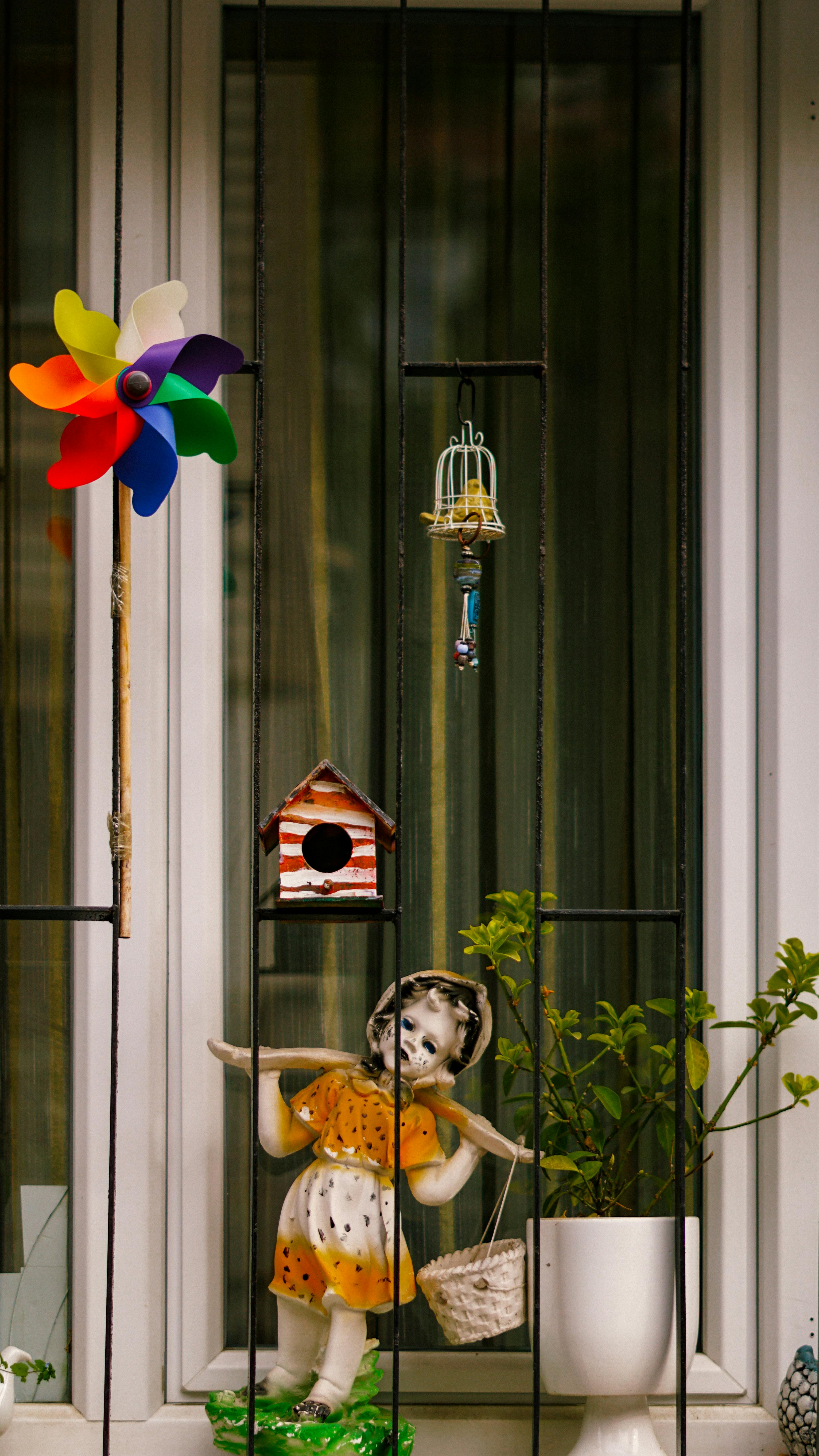 Toy Decorations on a Window Ledge · Free Stock Photo