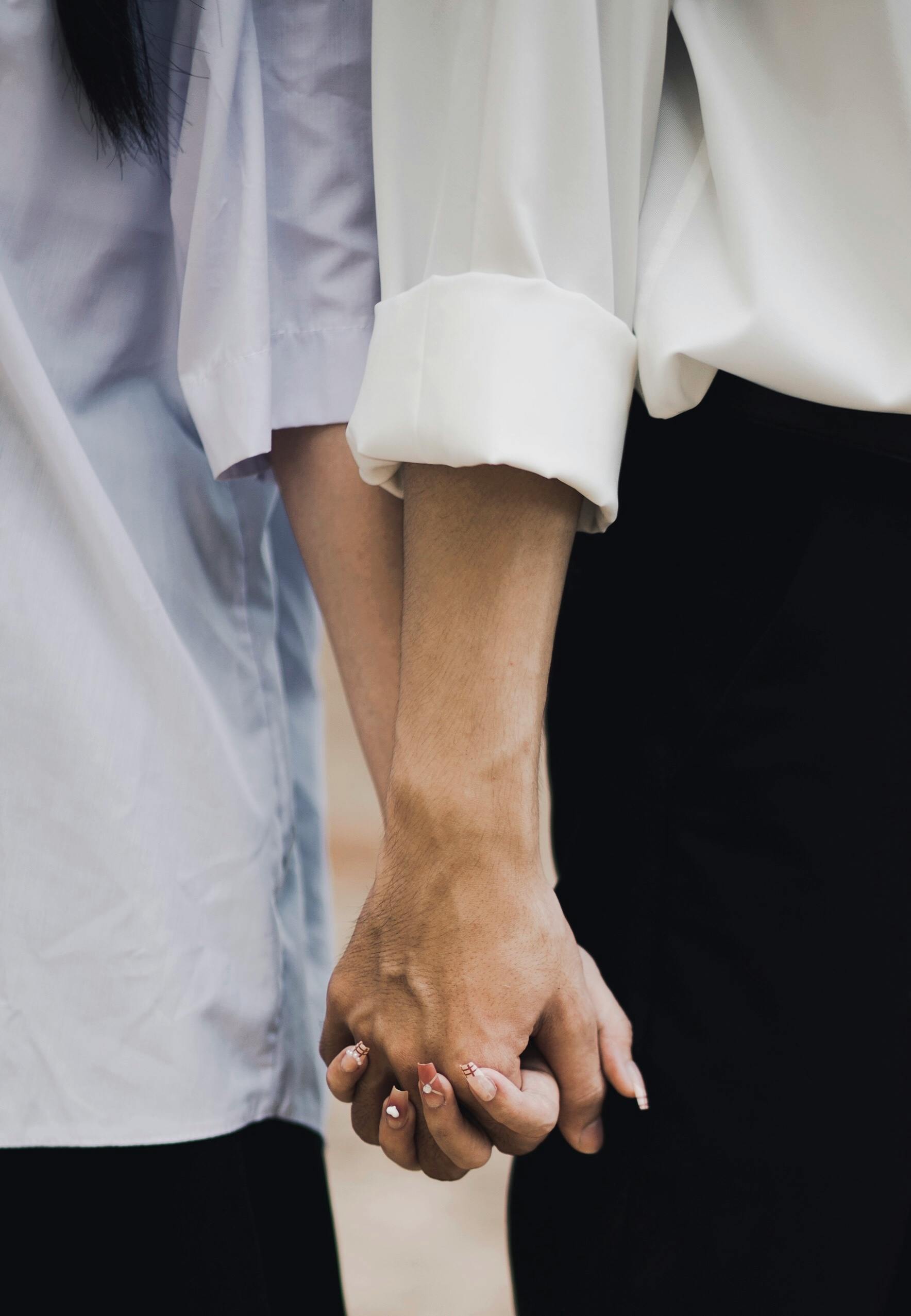 Women Holding Hands · Free Stock Photo