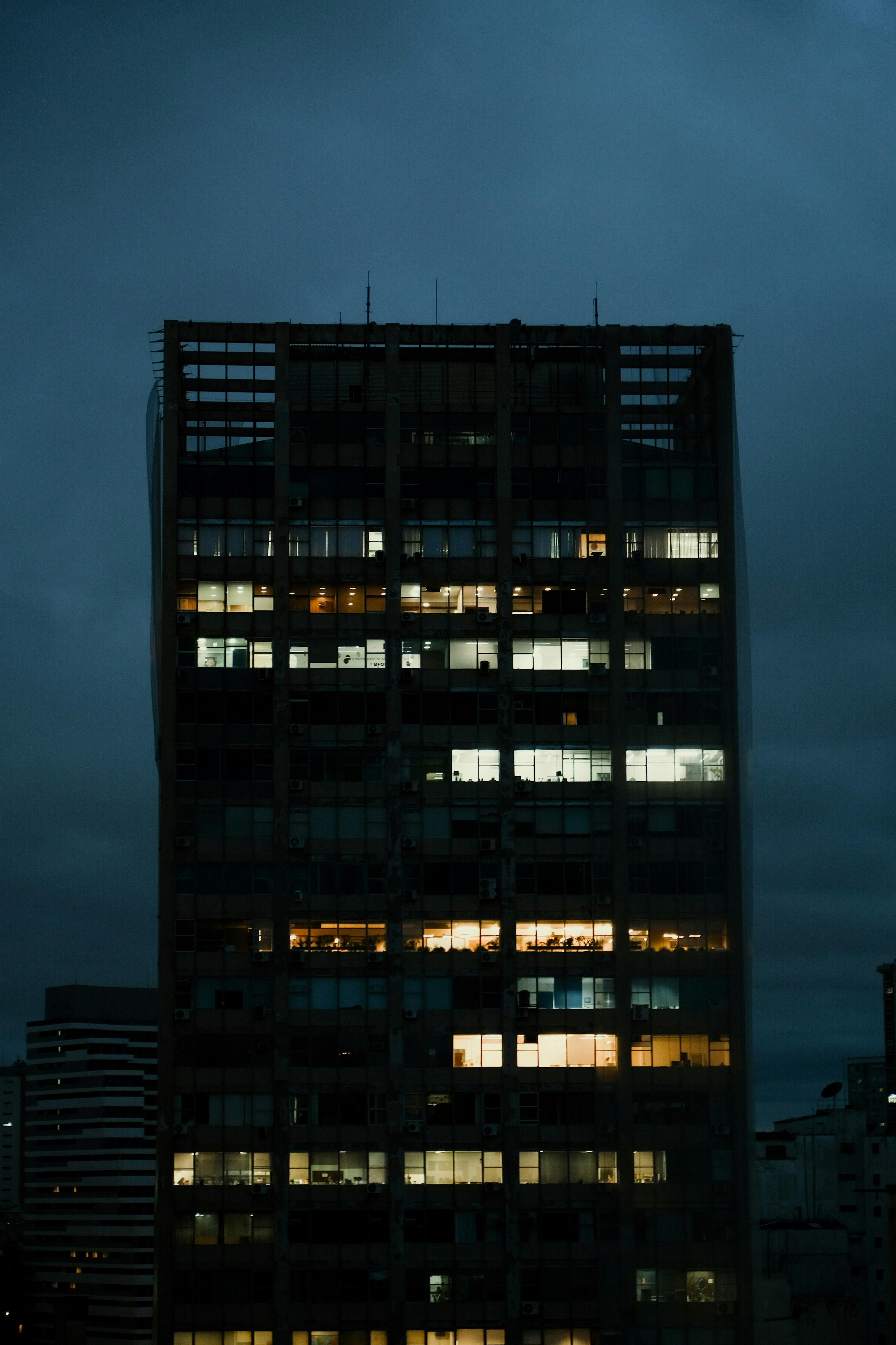 Aerial View of City With High Rise Building at Night Time · Free Stock ...