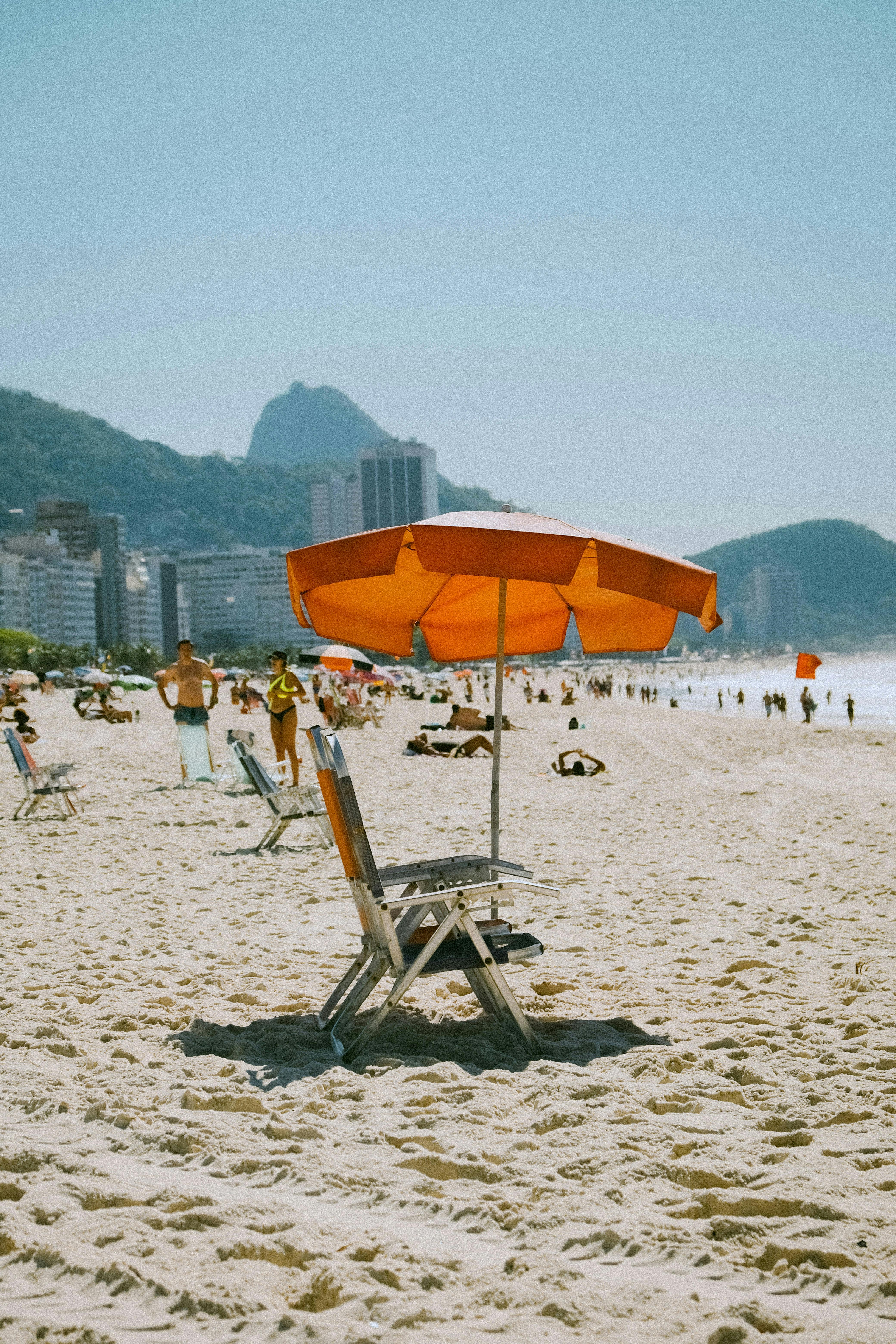 Beach Umbrella and Chair on Copacabana Beach on Seashore in Rio de ...
