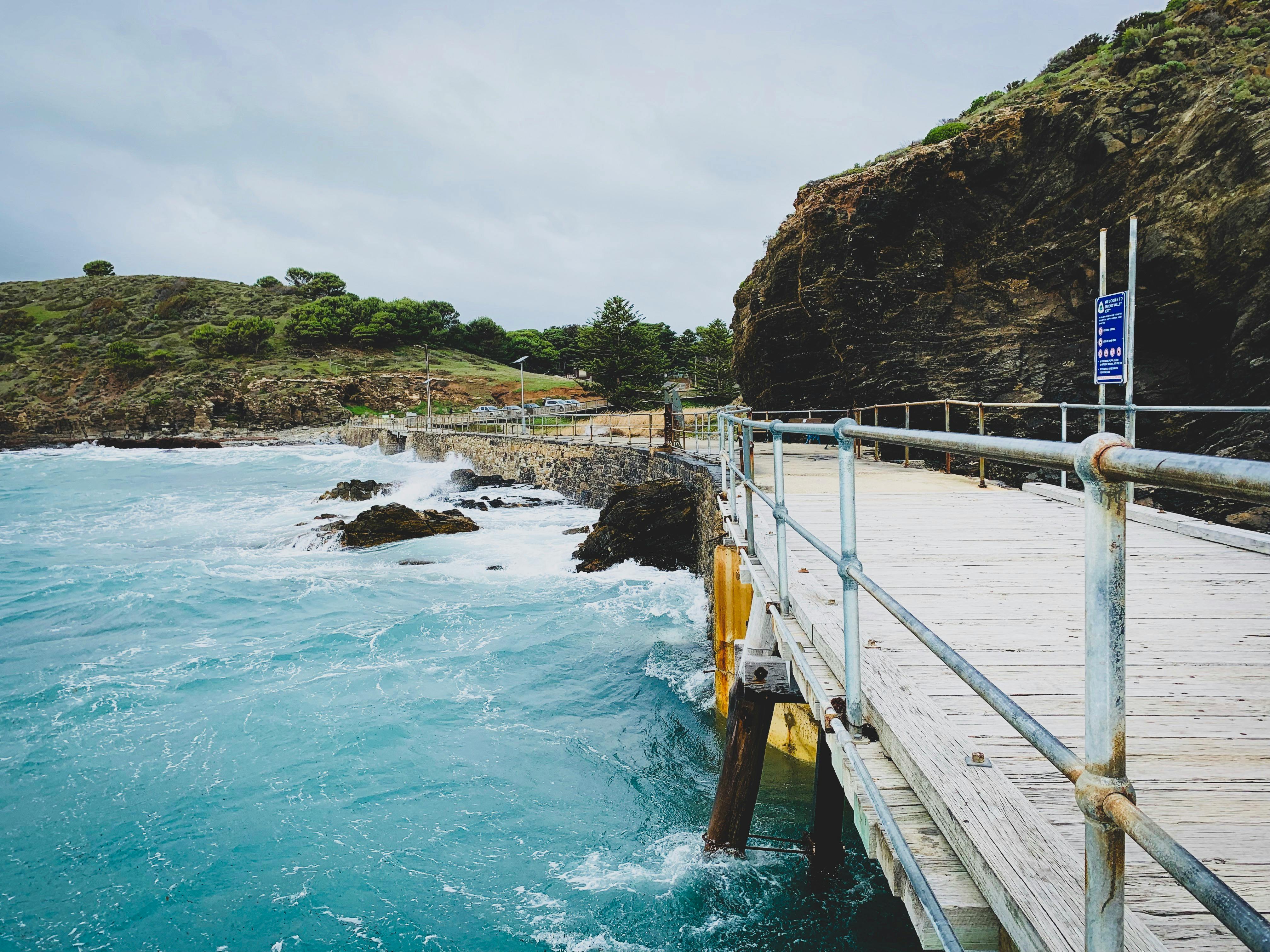 Photo of Bridge Near Ocean · Free Stock Photo