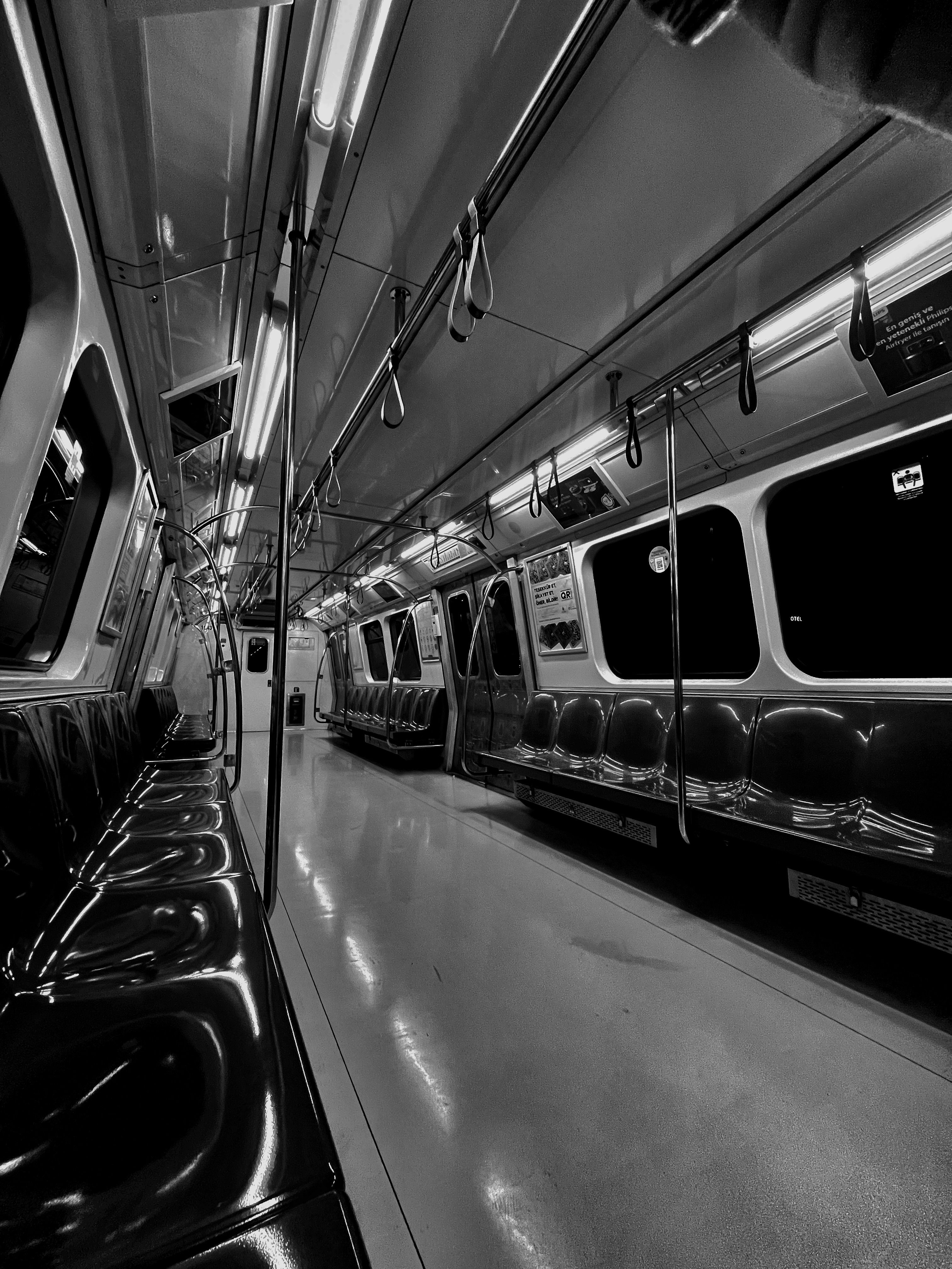 Seats in Subway Train in Black and White · Free Stock Photo