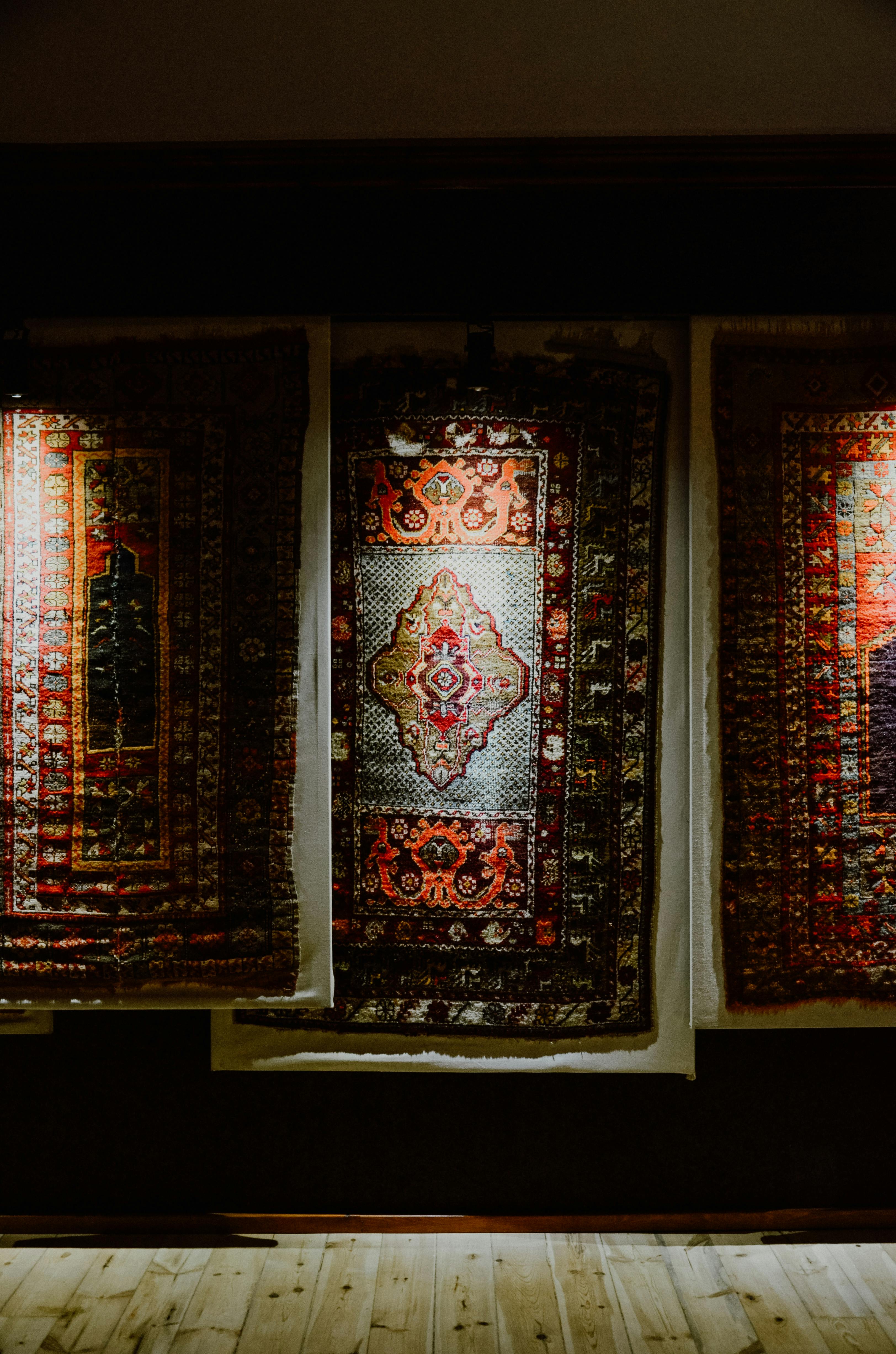 Traditional Carpets on Wall in Museum · Free Stock Photo
