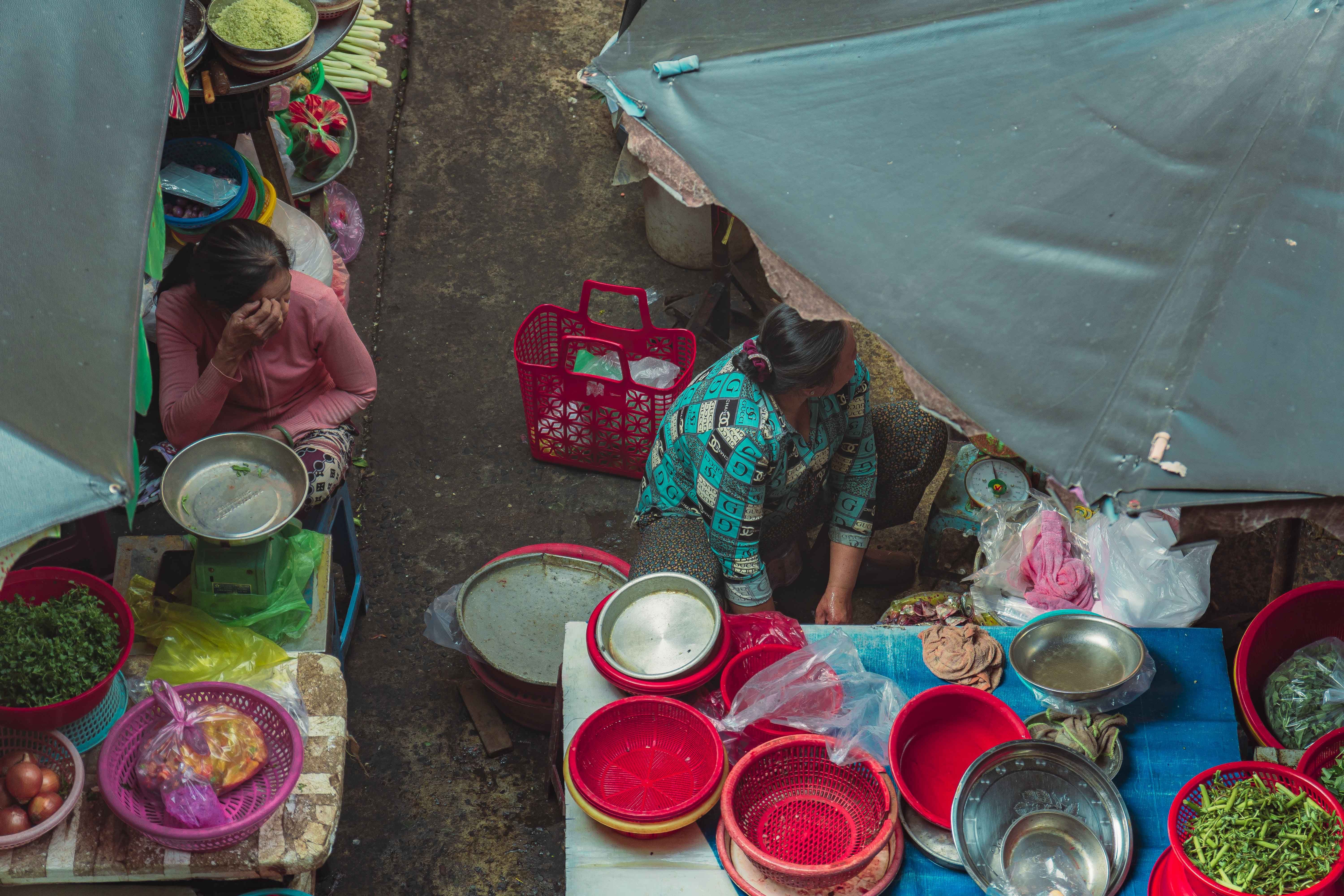 An overhead view of a market with people and food · Free Stock Photo