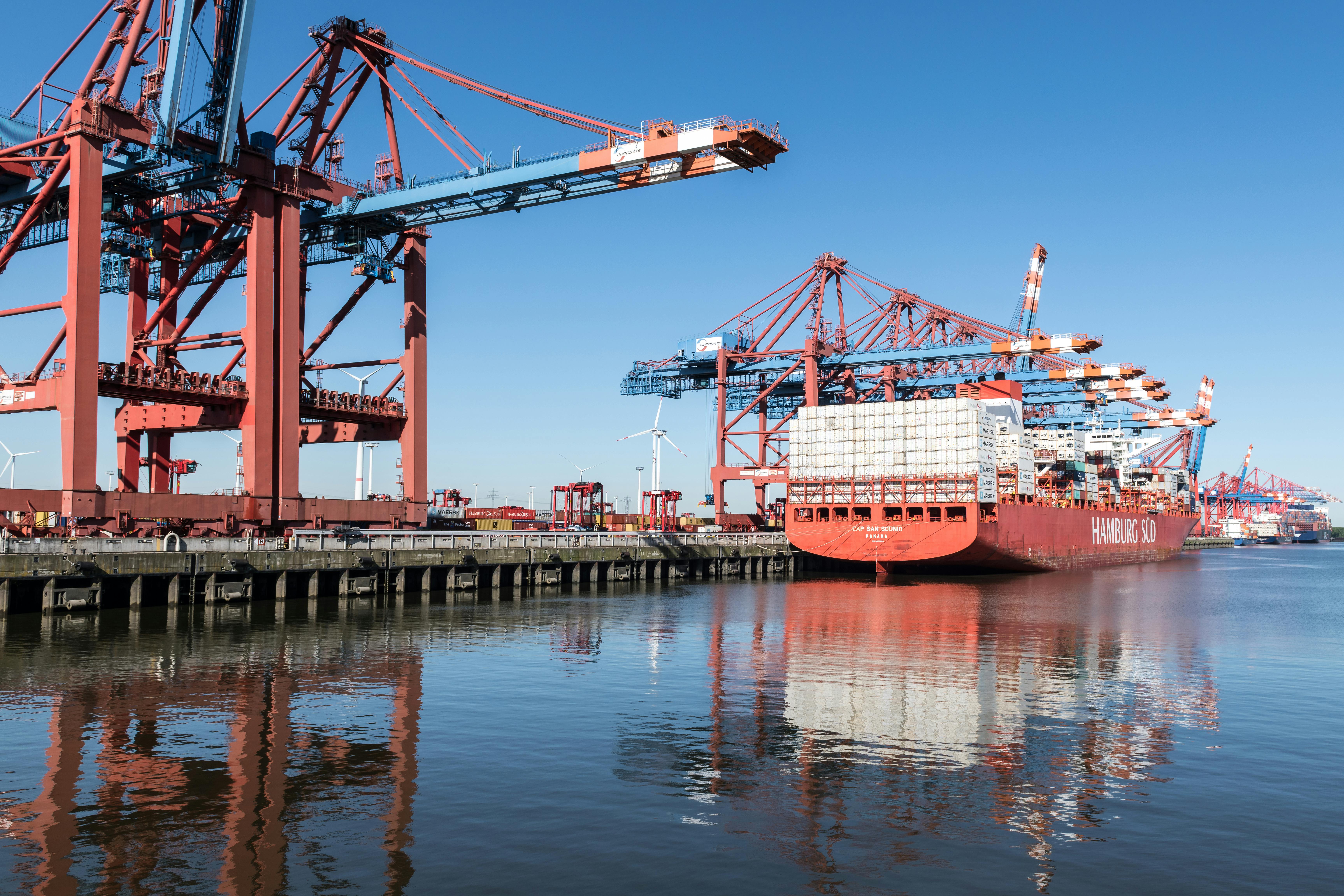 Container Ship Moored in Docks under Crane · Free Stock Photo