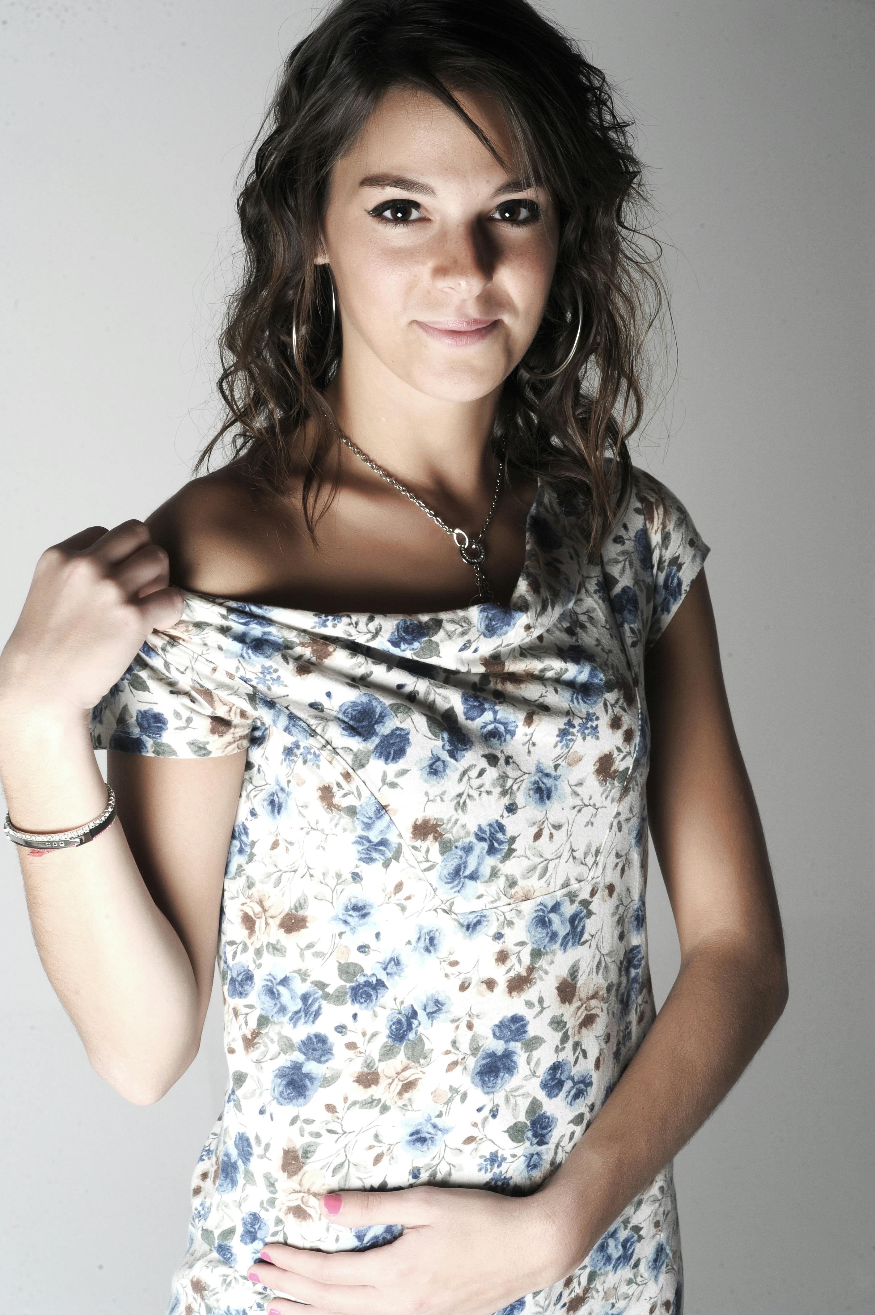 Woman Undressing Floral Dress · Free Stock Photo