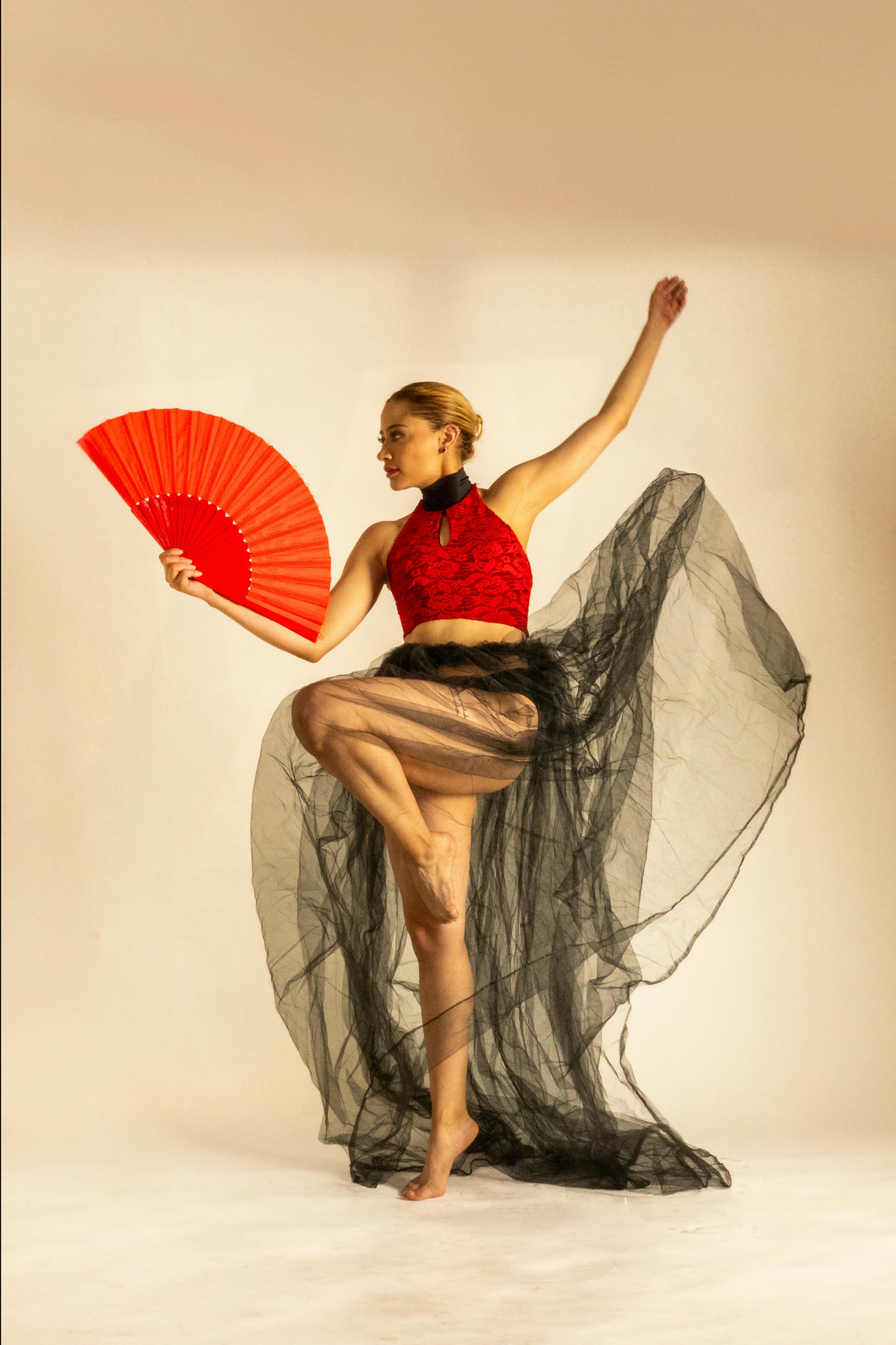 A Woman with a Fan · Free Stock Photo