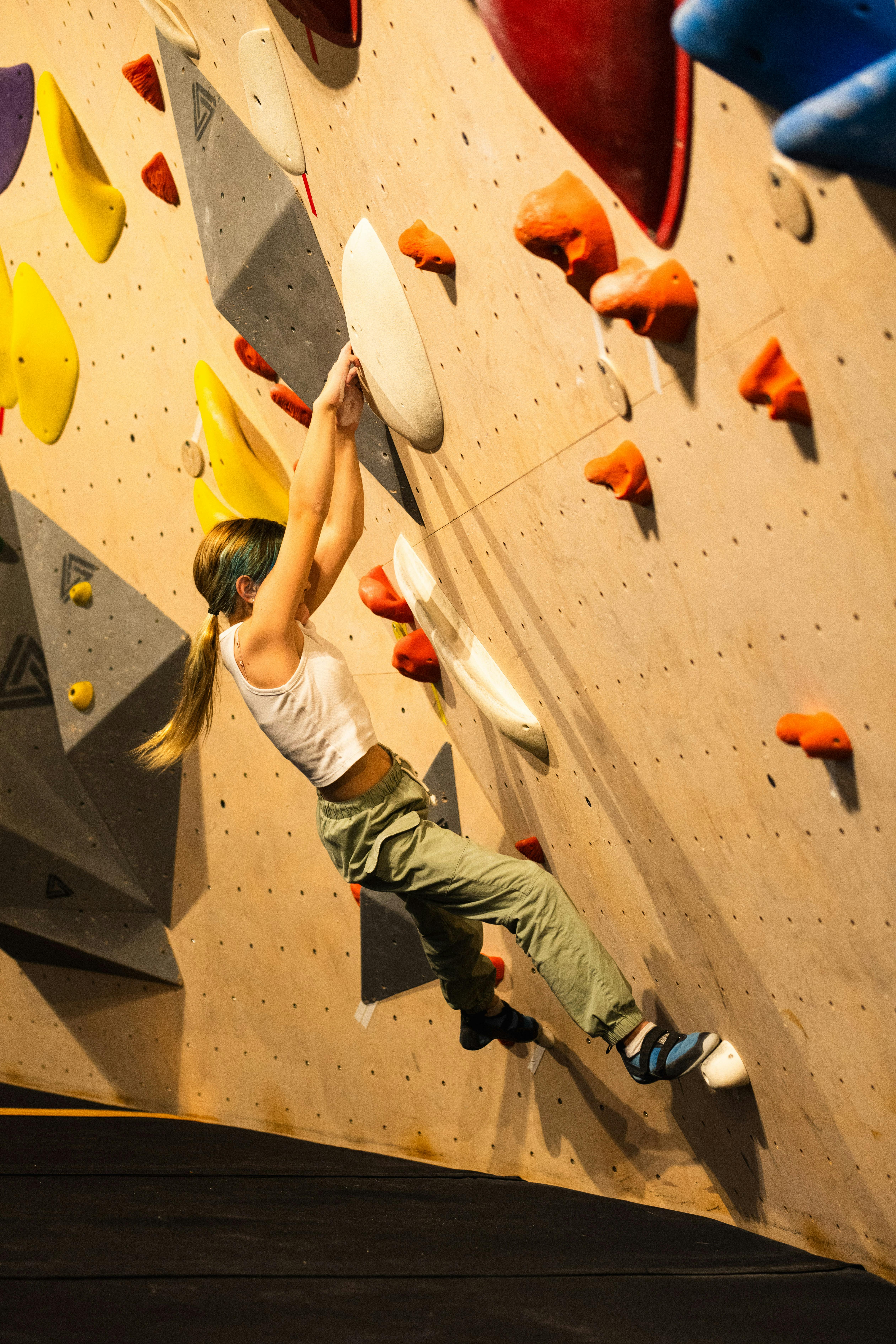 Girl Climbing Wall · Free Stock Photo