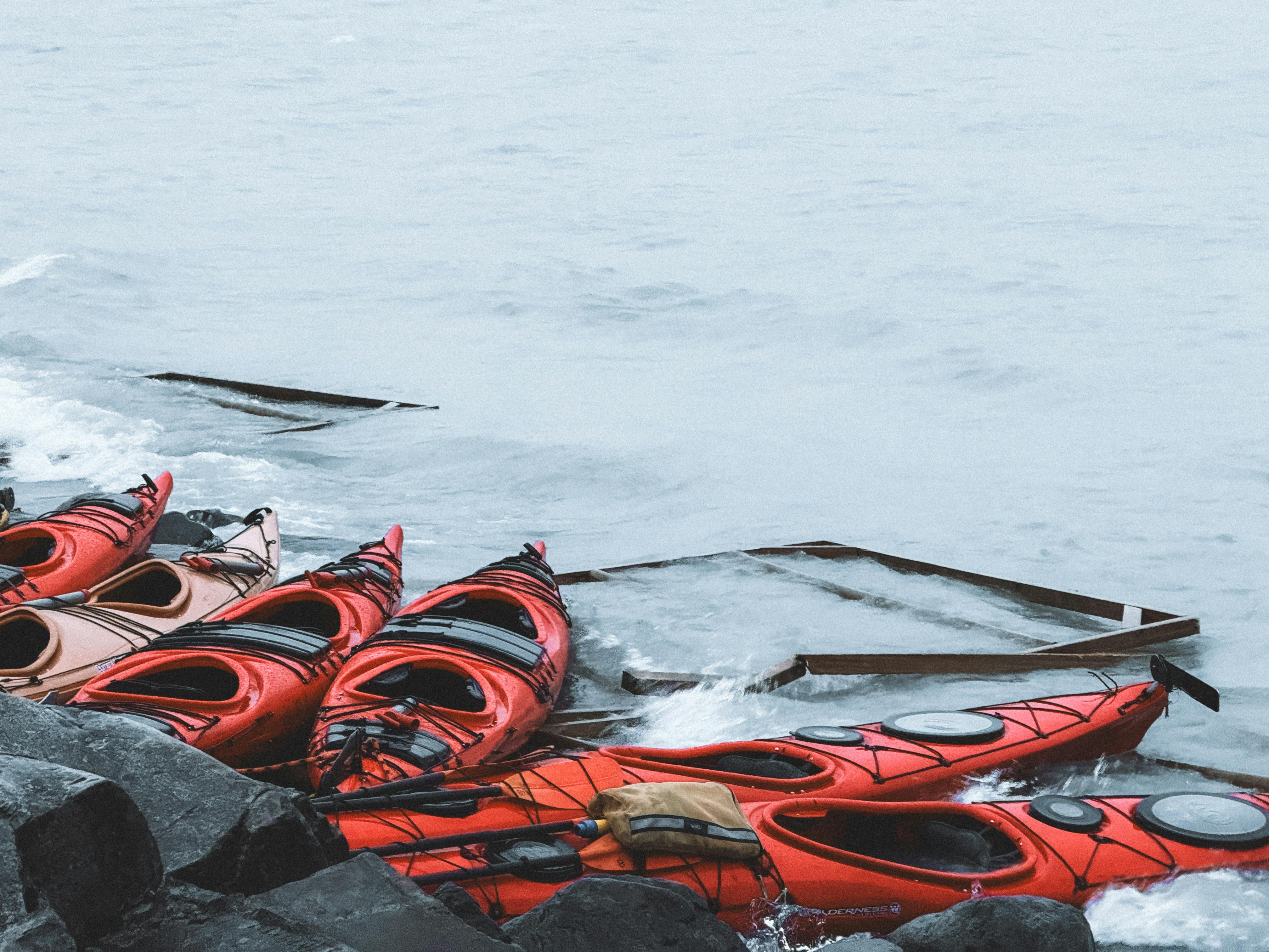 Red Kayaks on a Beach · Free Stock Photo