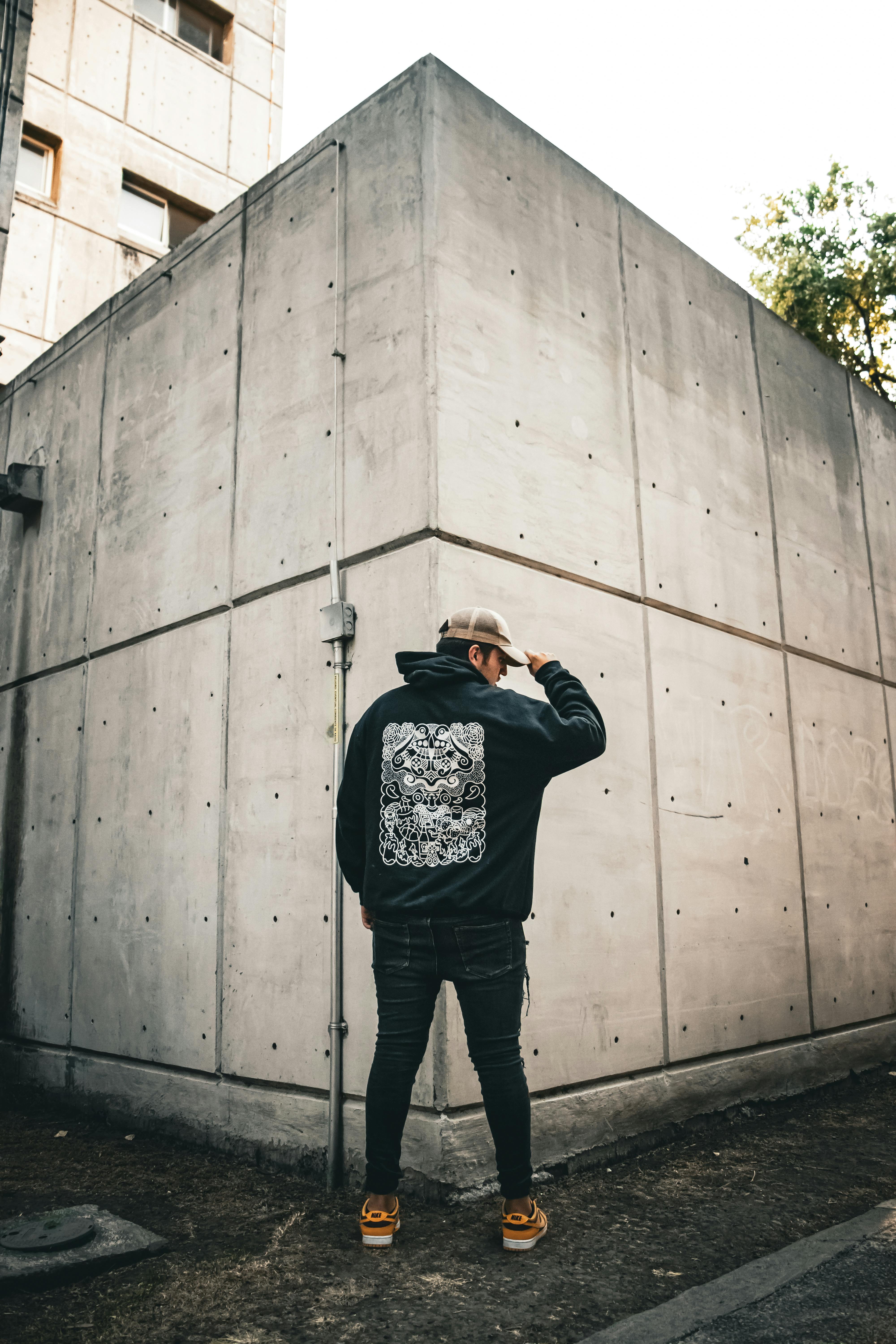 Back View of a Man Showing Off His Hoodie · Free Stock Photo
