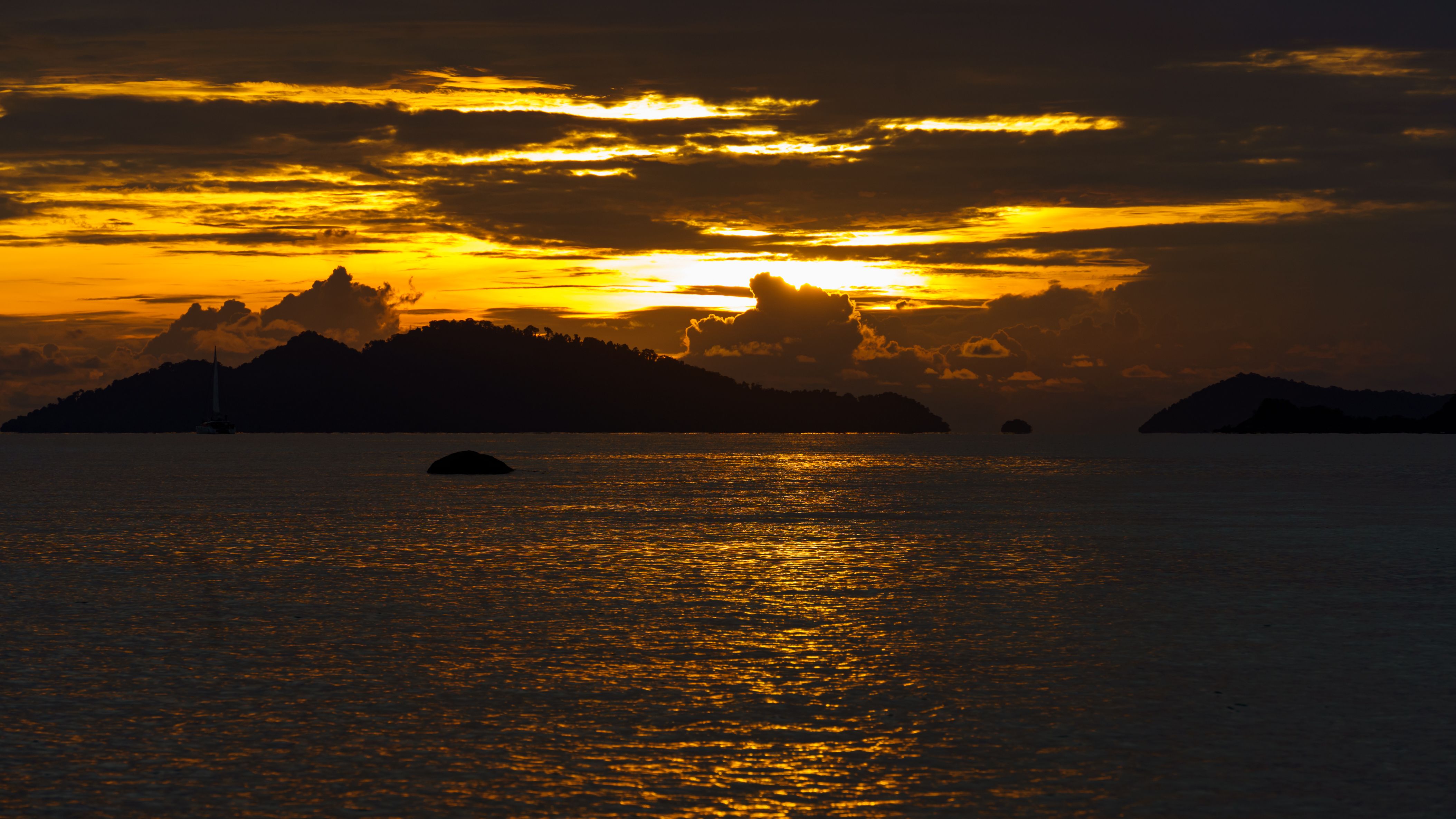 Sun Rays over Sea With Islands · Free Stock Photo
