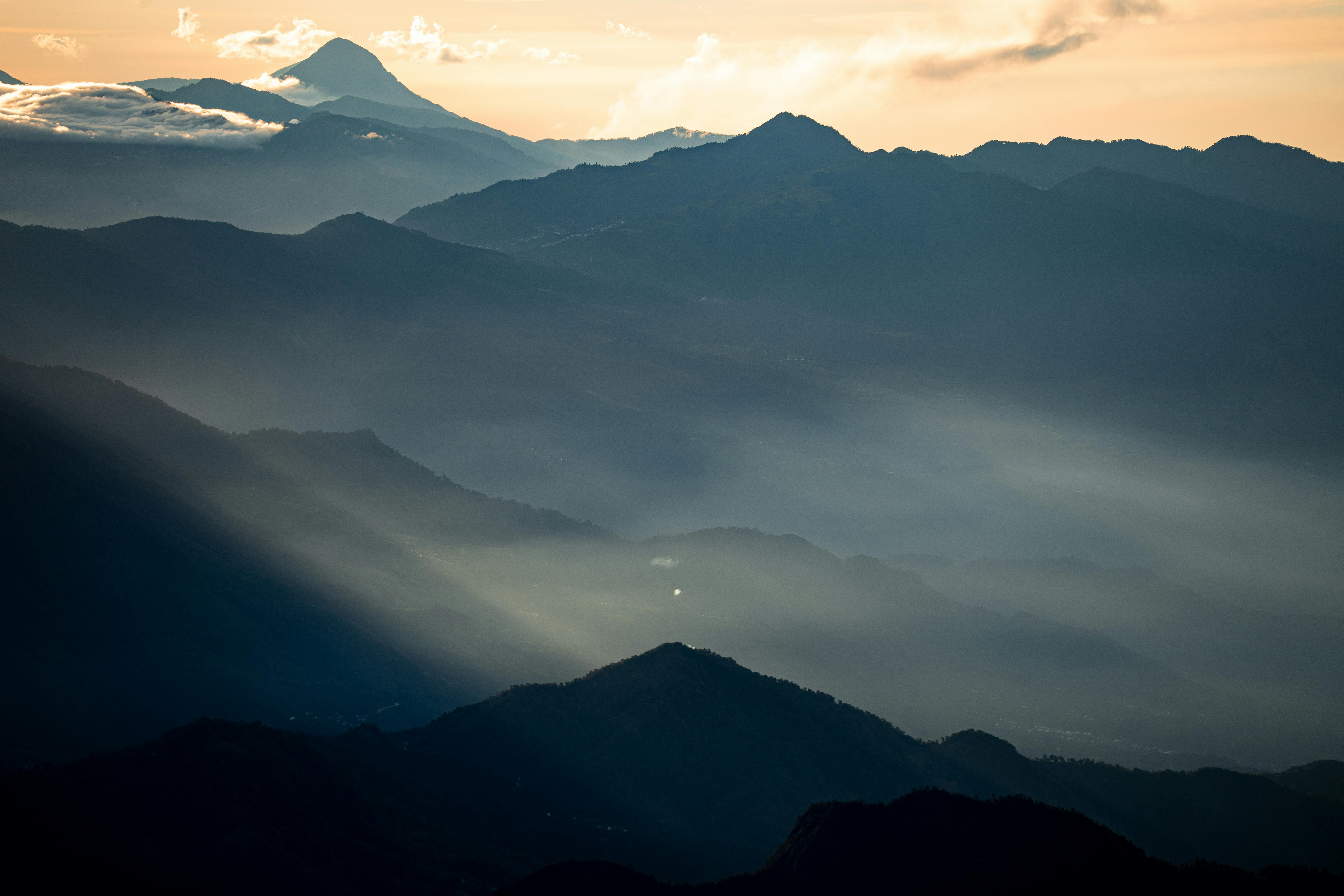 Fog over Hills and Mountains at Sunset · Free Stock Photo