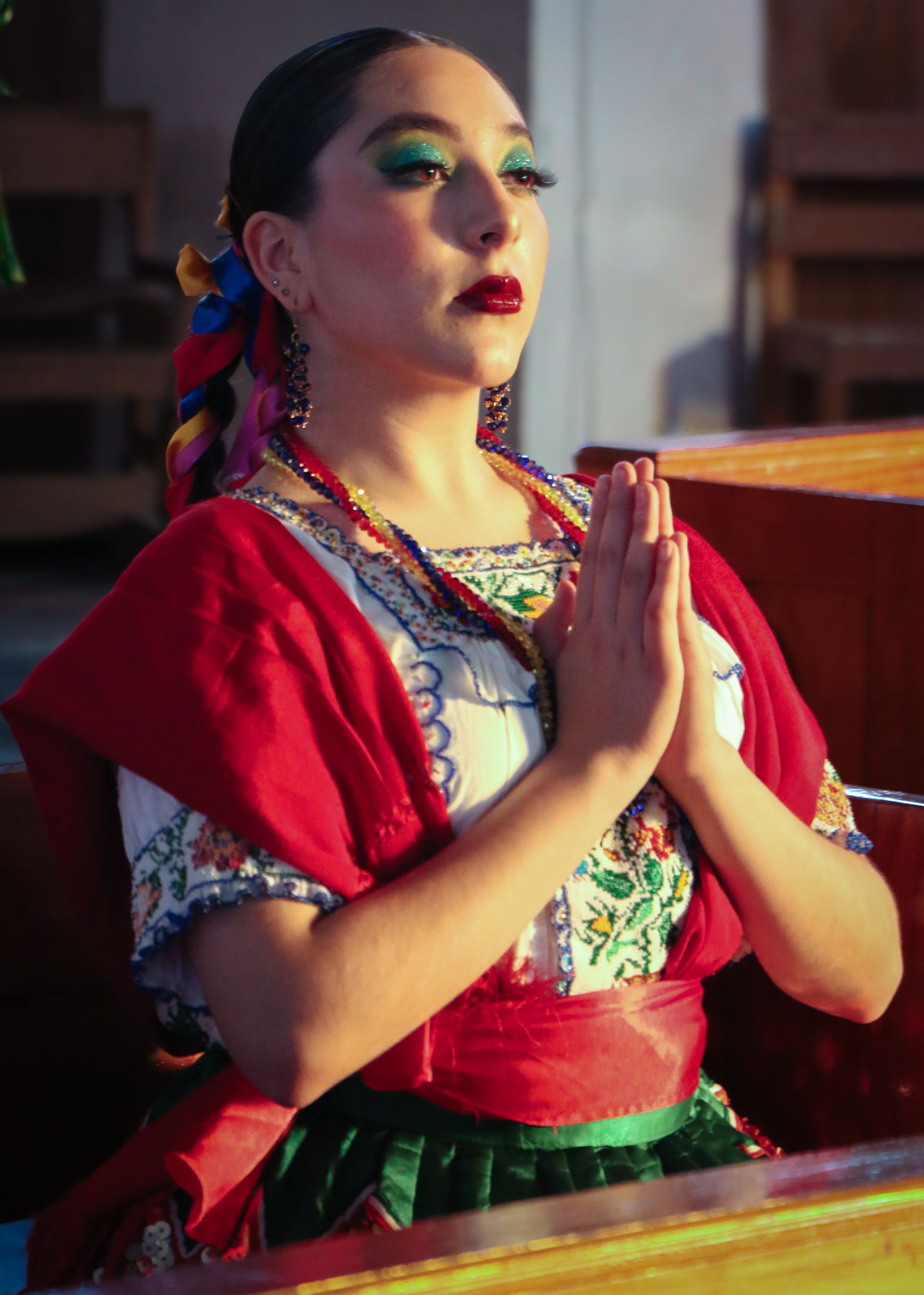 Woman in Folklore Dress while Praying · Free Stock Photo