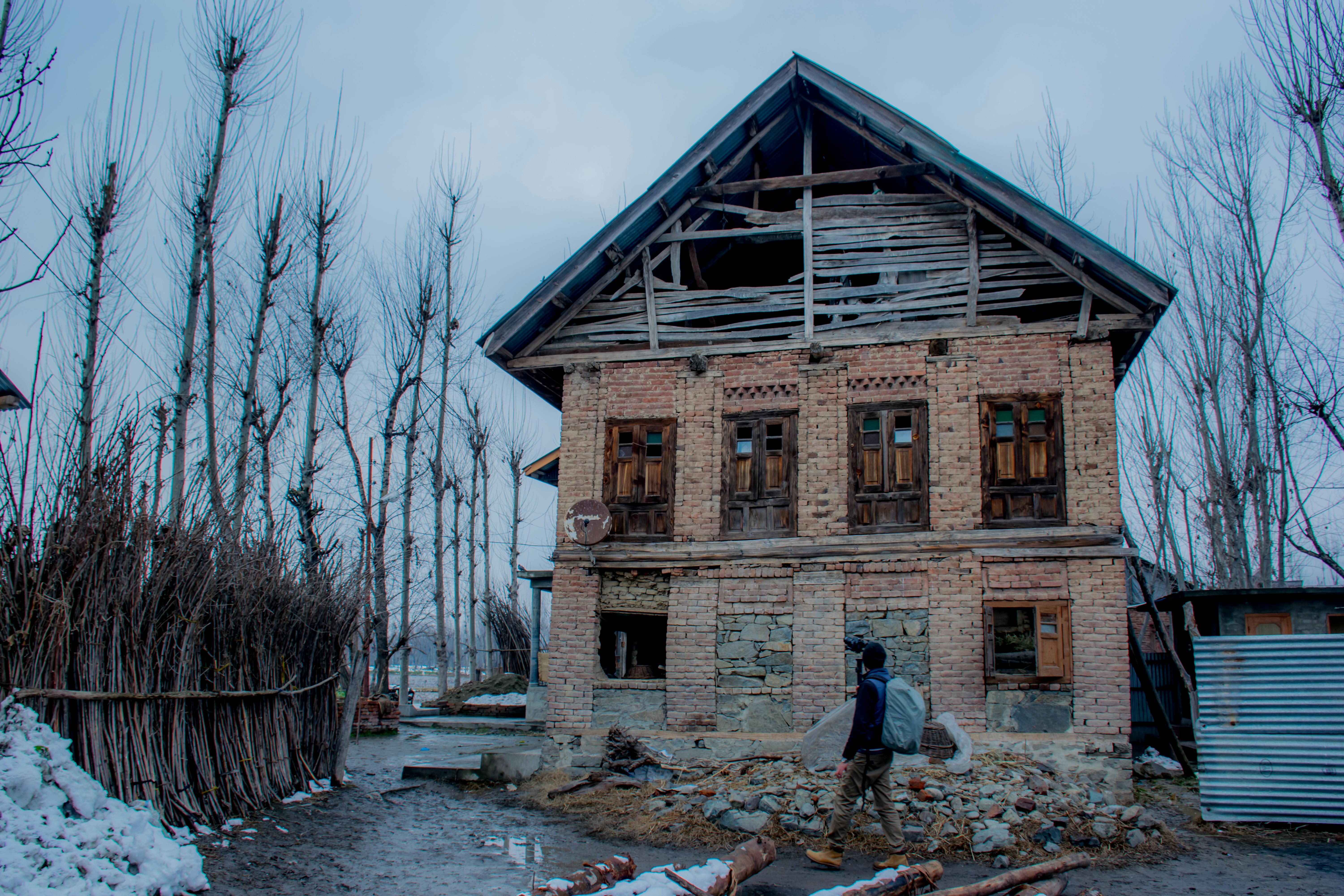 Abandoned Run Down Brick House in Winter · Free Stock Photo