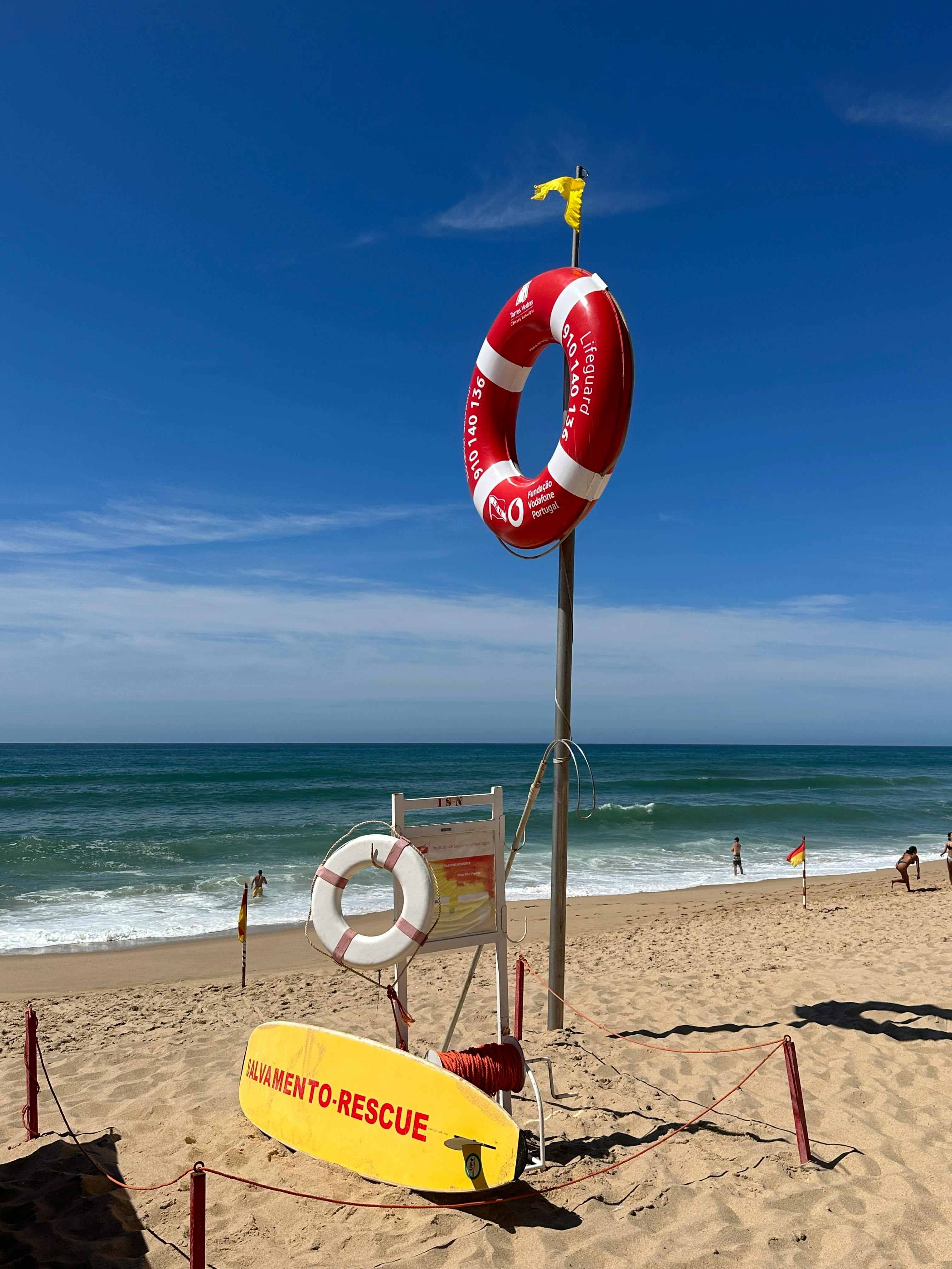 Life Rings on Beach · Free Stock Photo