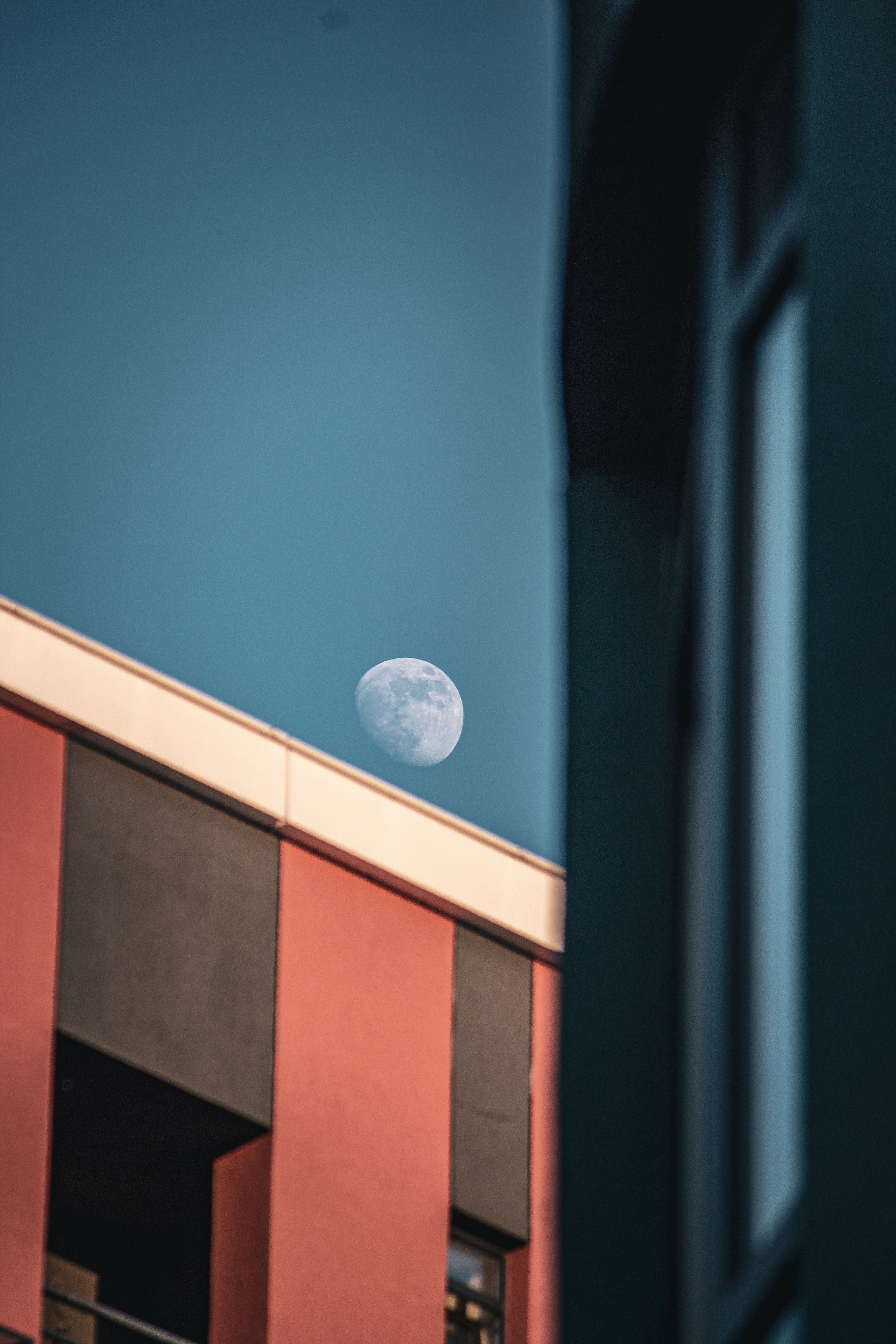 Moon Above Buildings · Free Stock Photo
