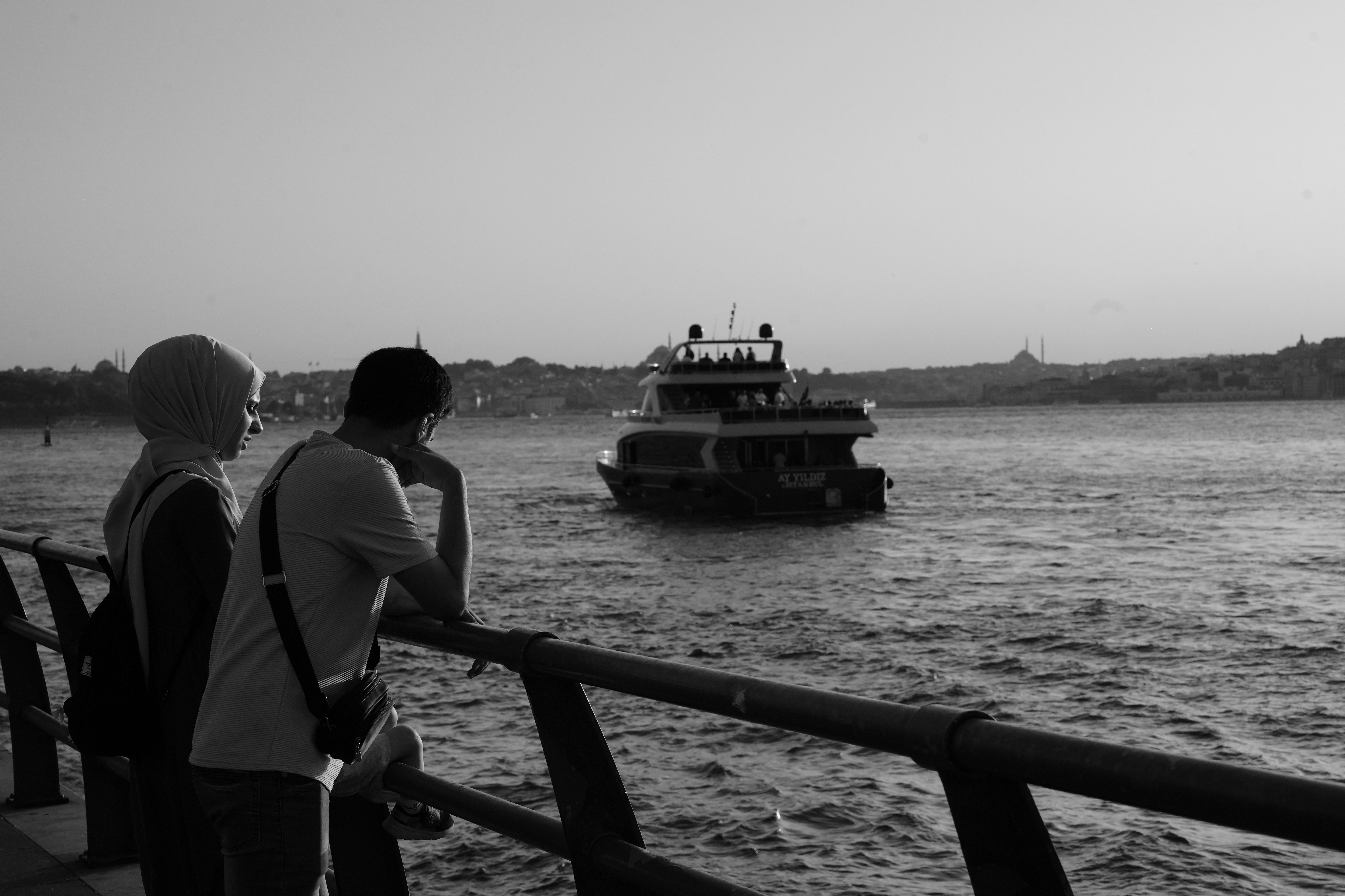 Man and Woman Looking at a Boat · Free Stock Photo