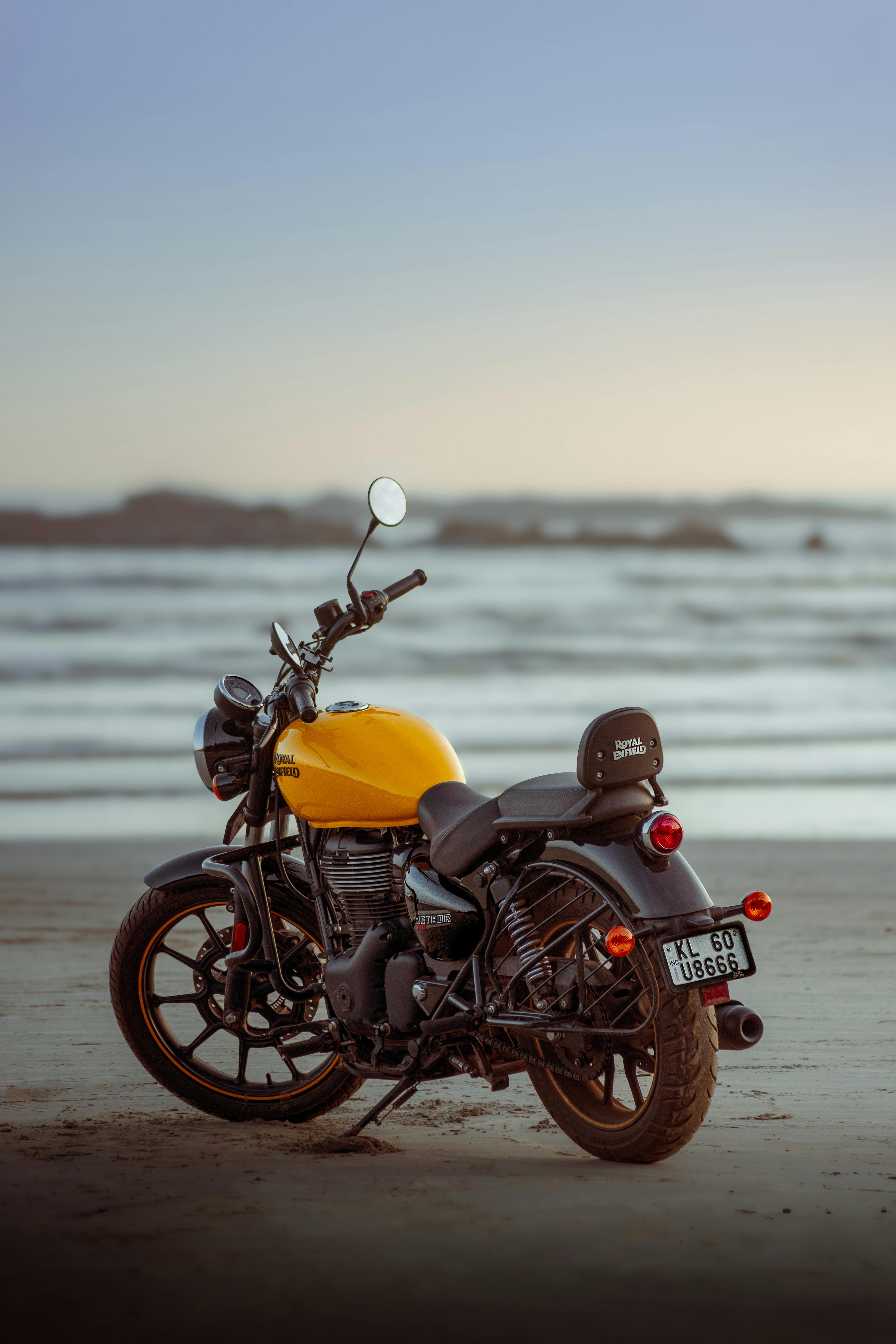 Back View of a Motorcycle Parked on the Beach · Free Stock Photo