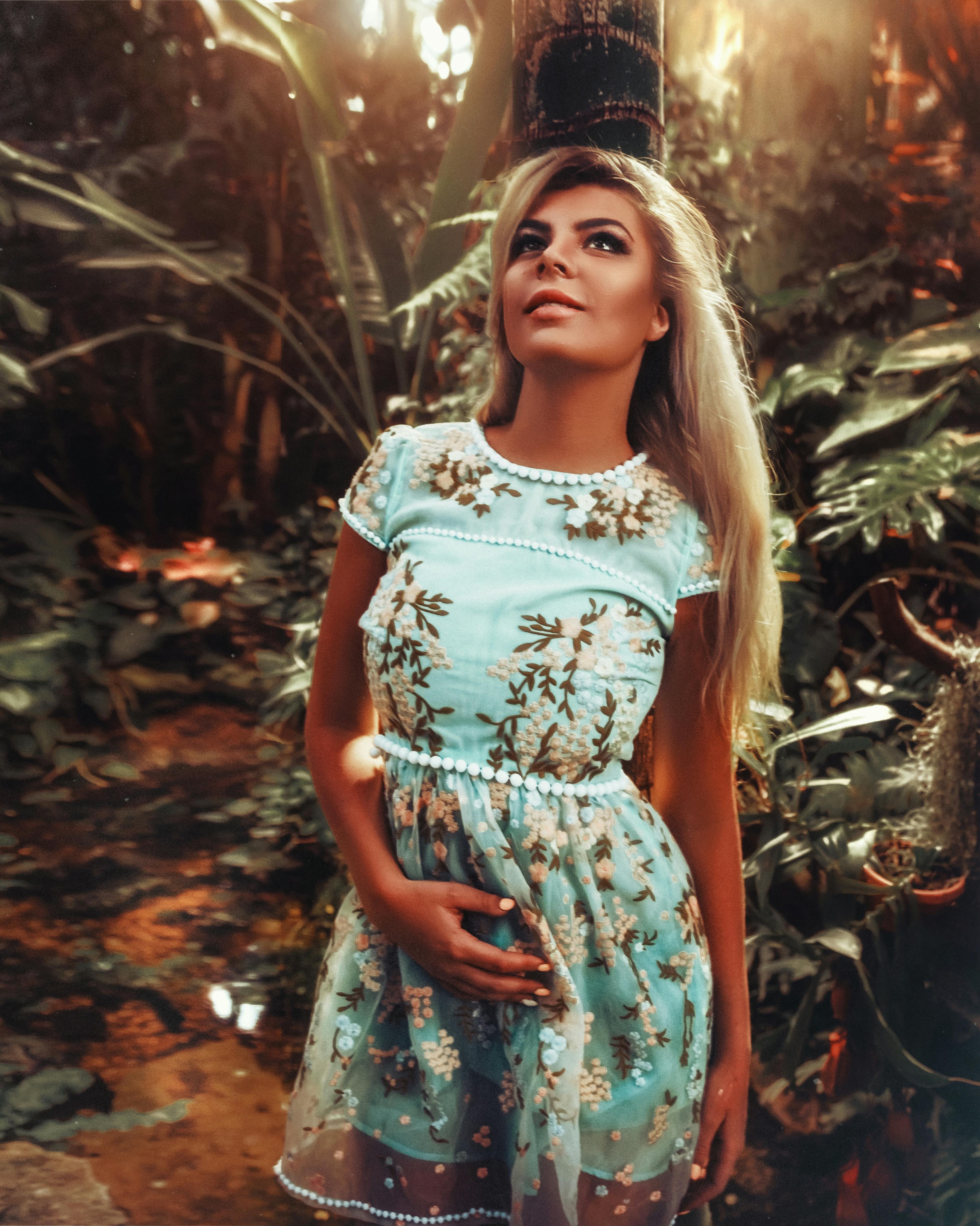 Woman Standing Beside Tree · Free Stock Photo