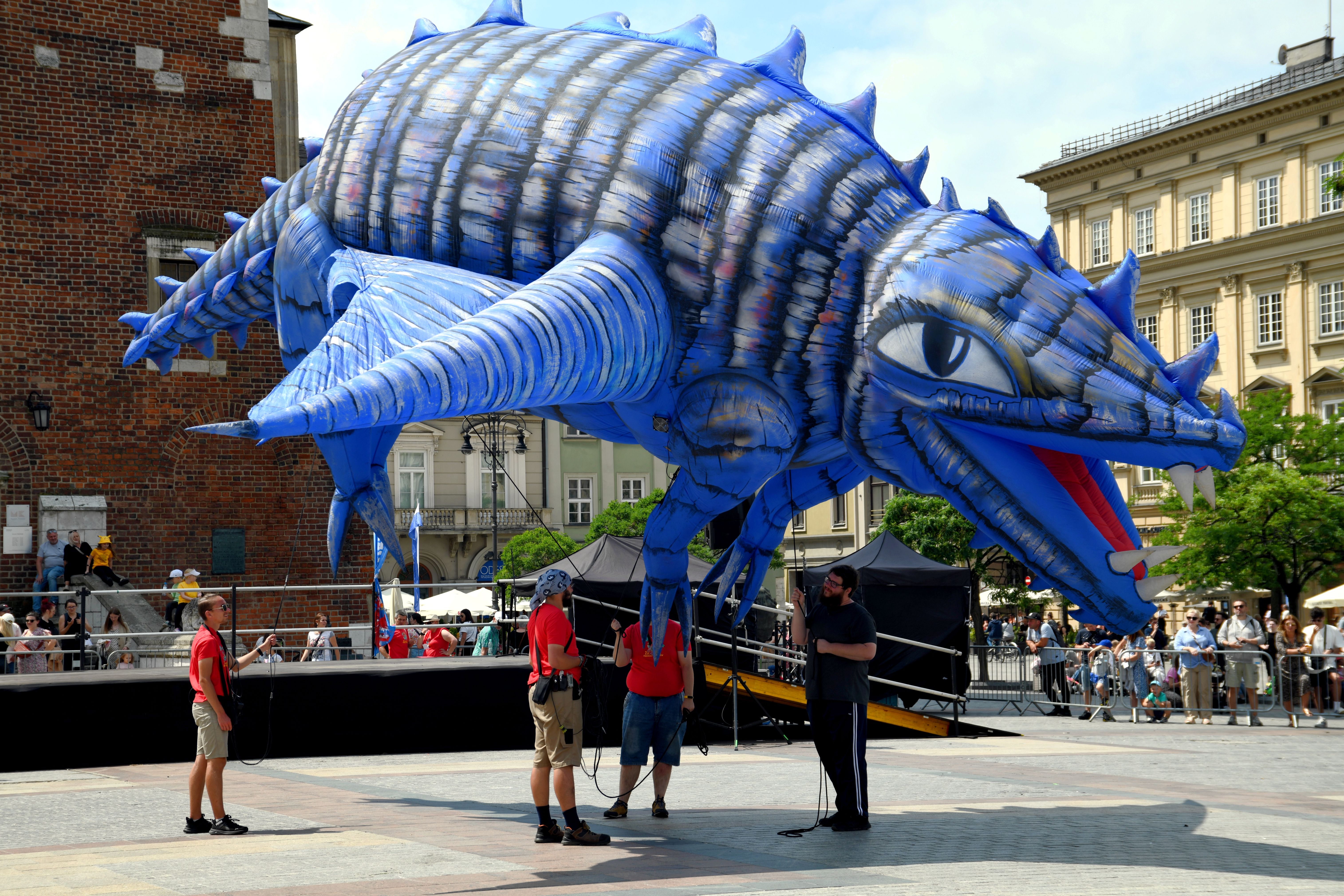 Men Holding a Large Dragon Balloon at the Parade in a City · Free Stock ...