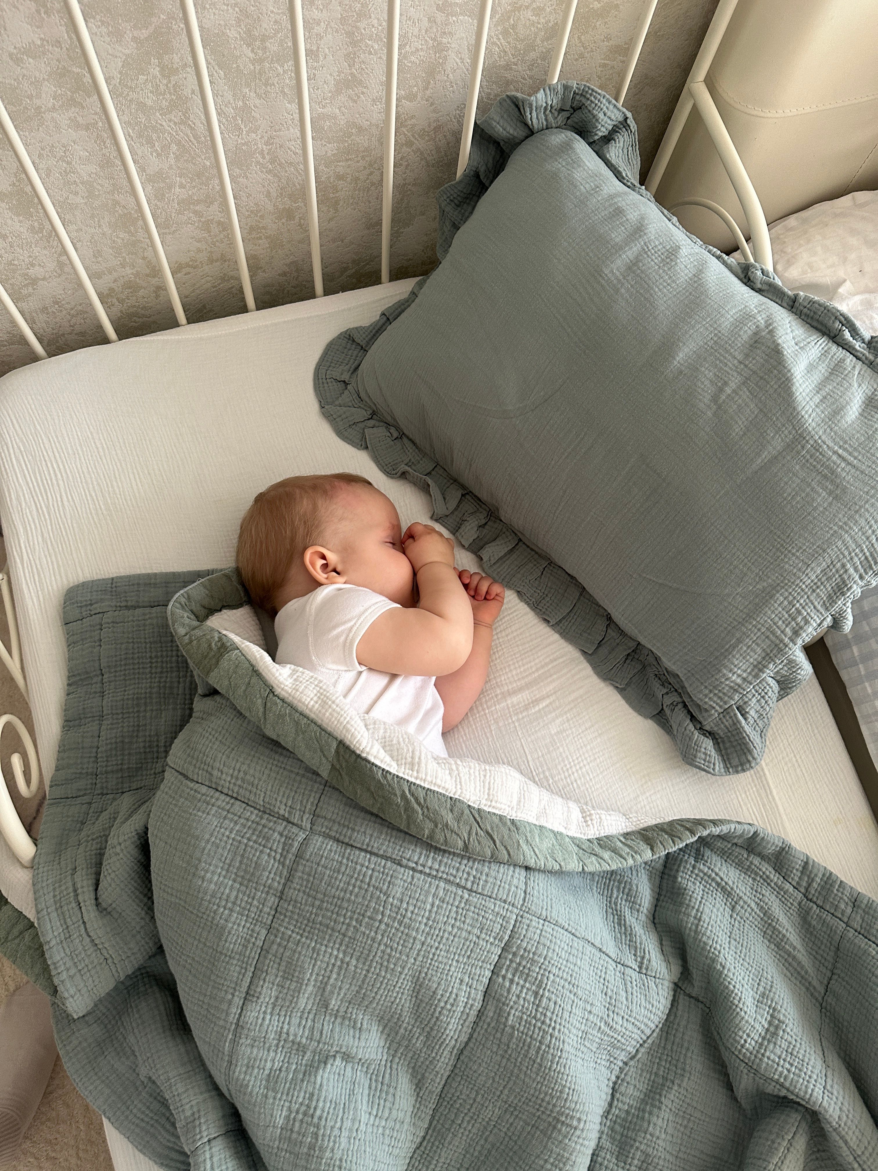 Baby Lying Down in Crib and Sleeping · Free Stock Photo