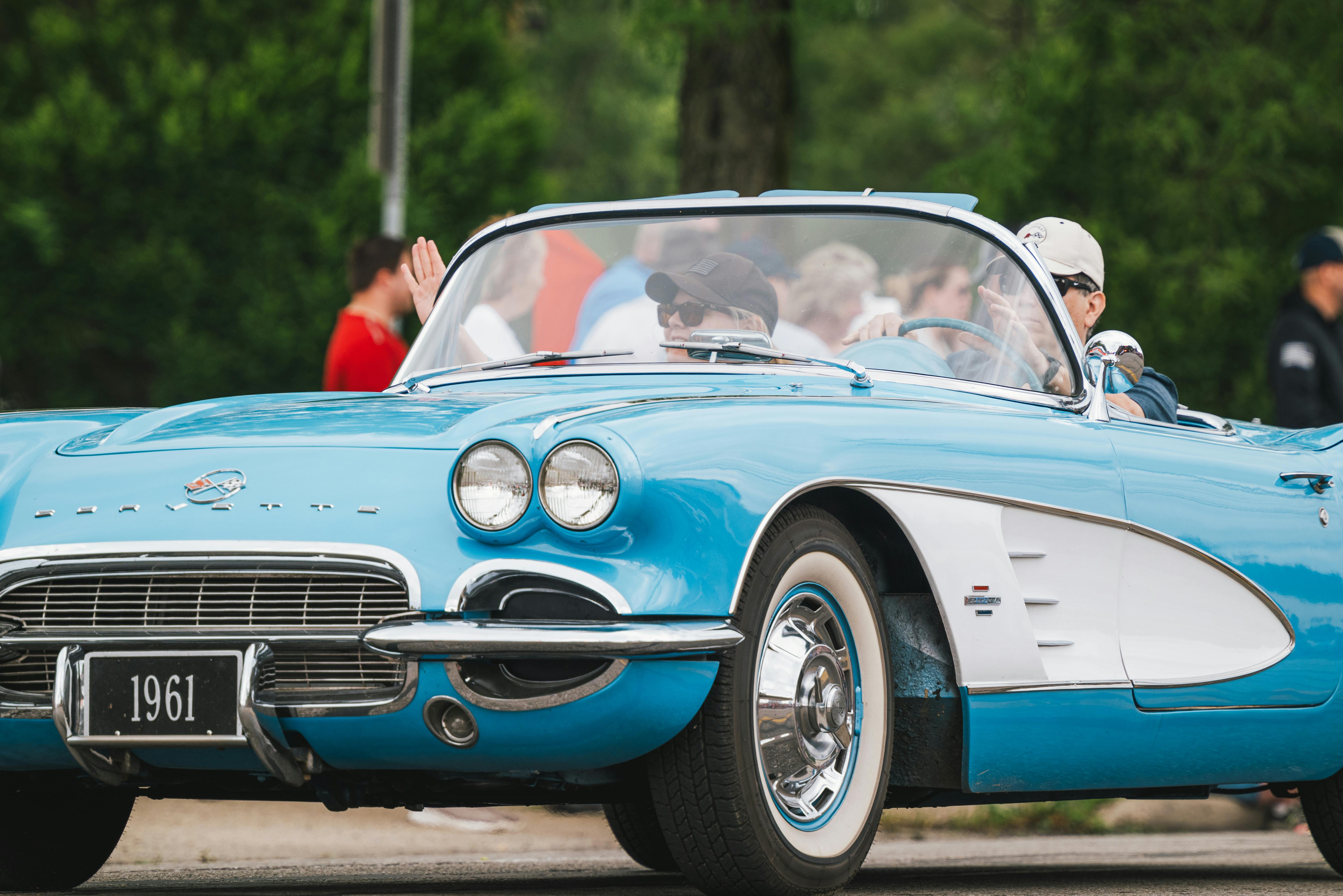Man Driving Blue, Vintage Chevrolet Corvette Cabriolet · Free Stock Photo