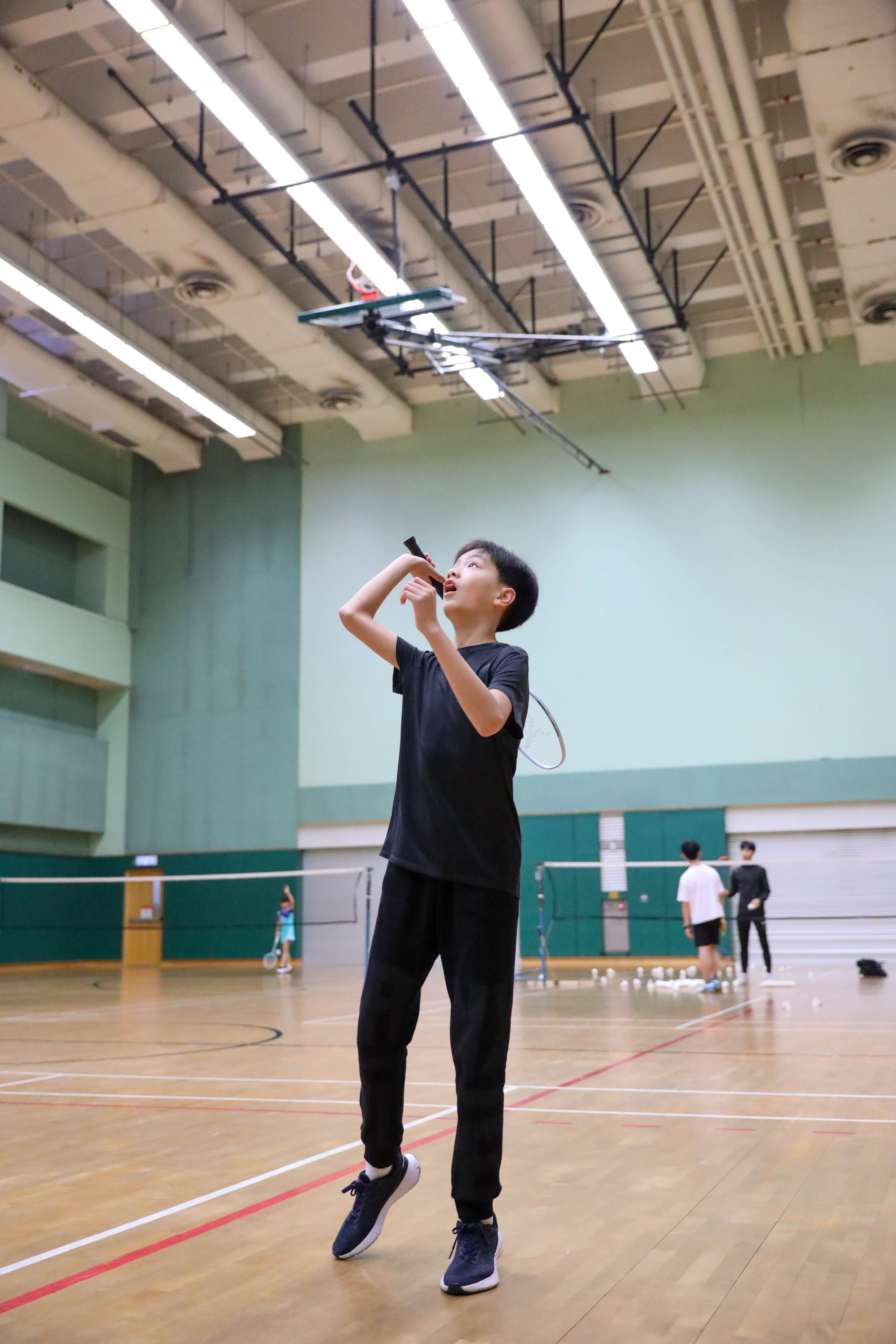 Man Playing Badminton at the Gym · Free Stock Photo