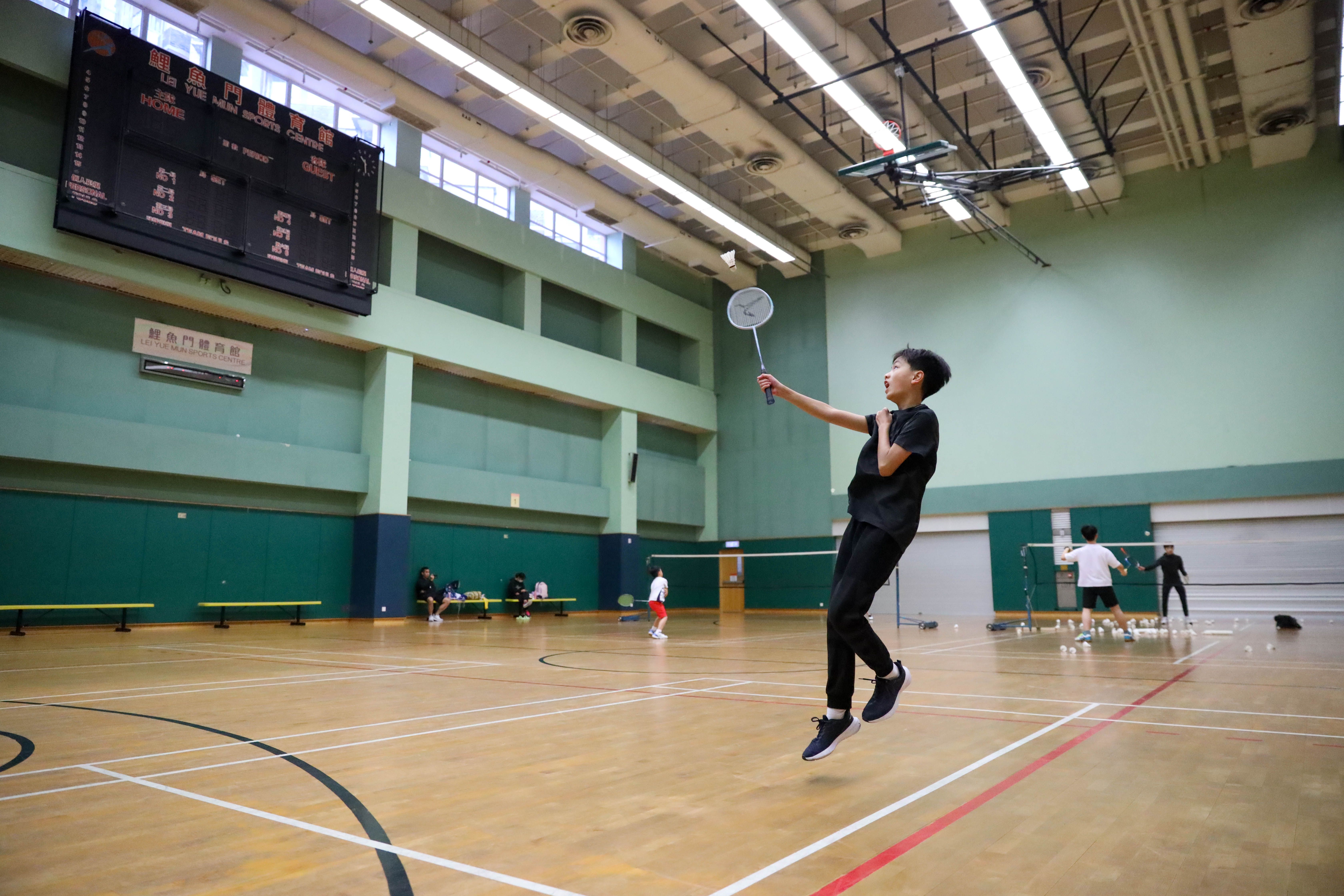 Man Playing Badminton at the Gym · Free Stock Photo